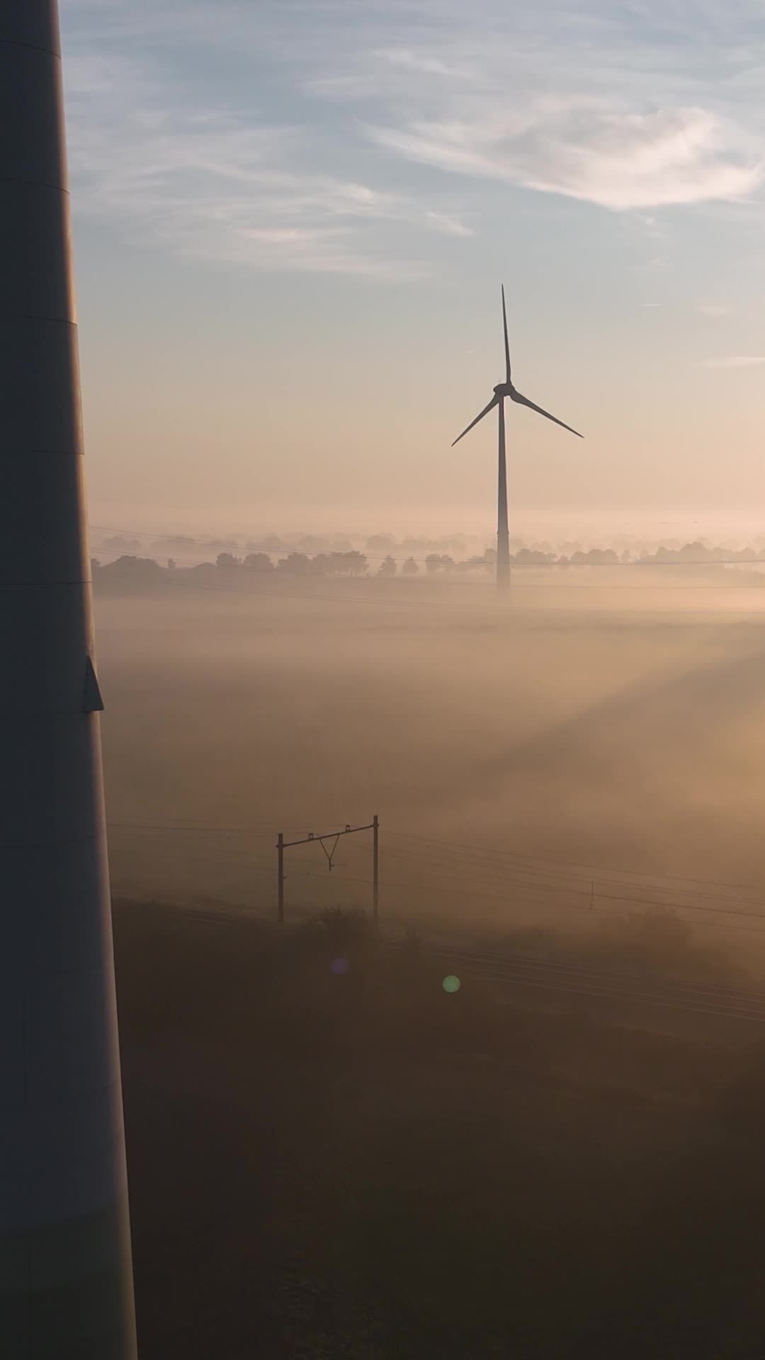 Aerial View of Foggy Wind Farm at Sunrise Free Stock Video Footage ...