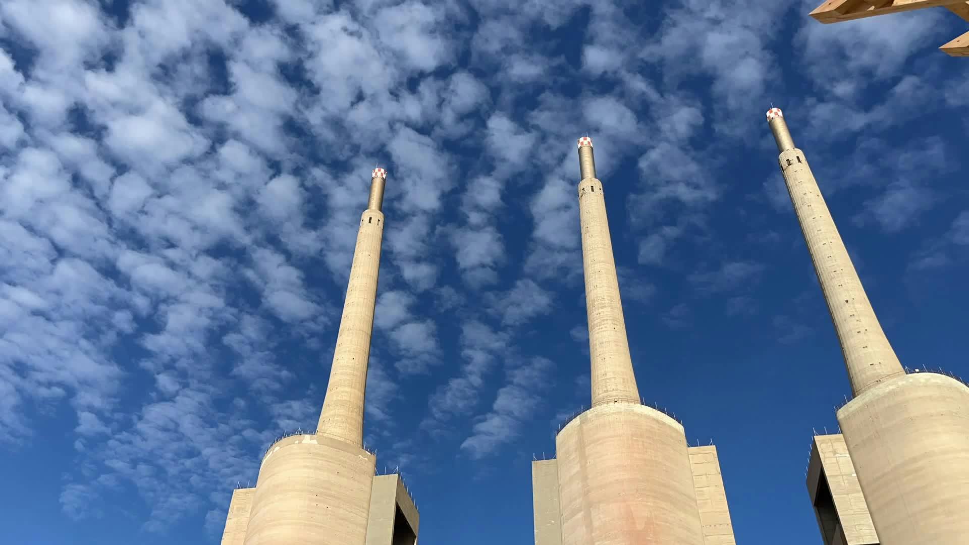 Three Tall Towers Reaching into Blue Sky Free Stock Video Footage ...
