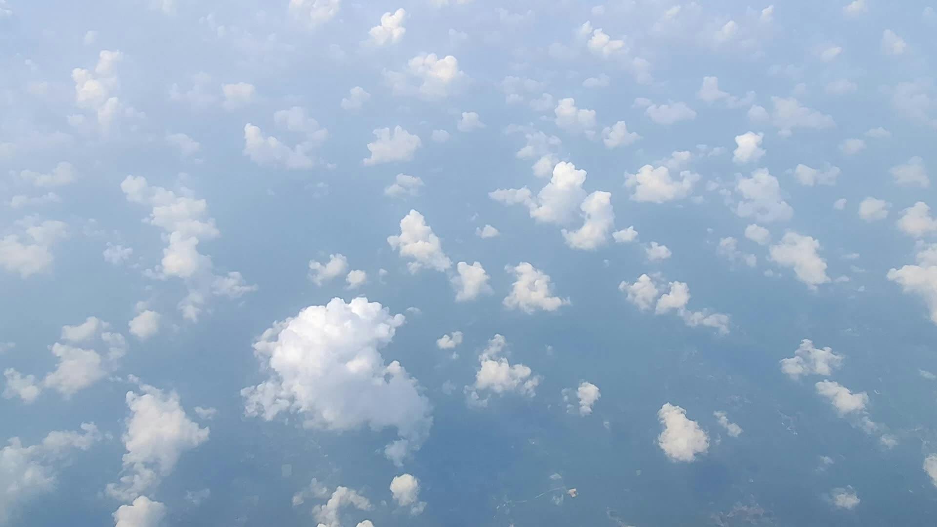 Aerial View of Scattered Clouds Over Land Free Stock Video Footage ...