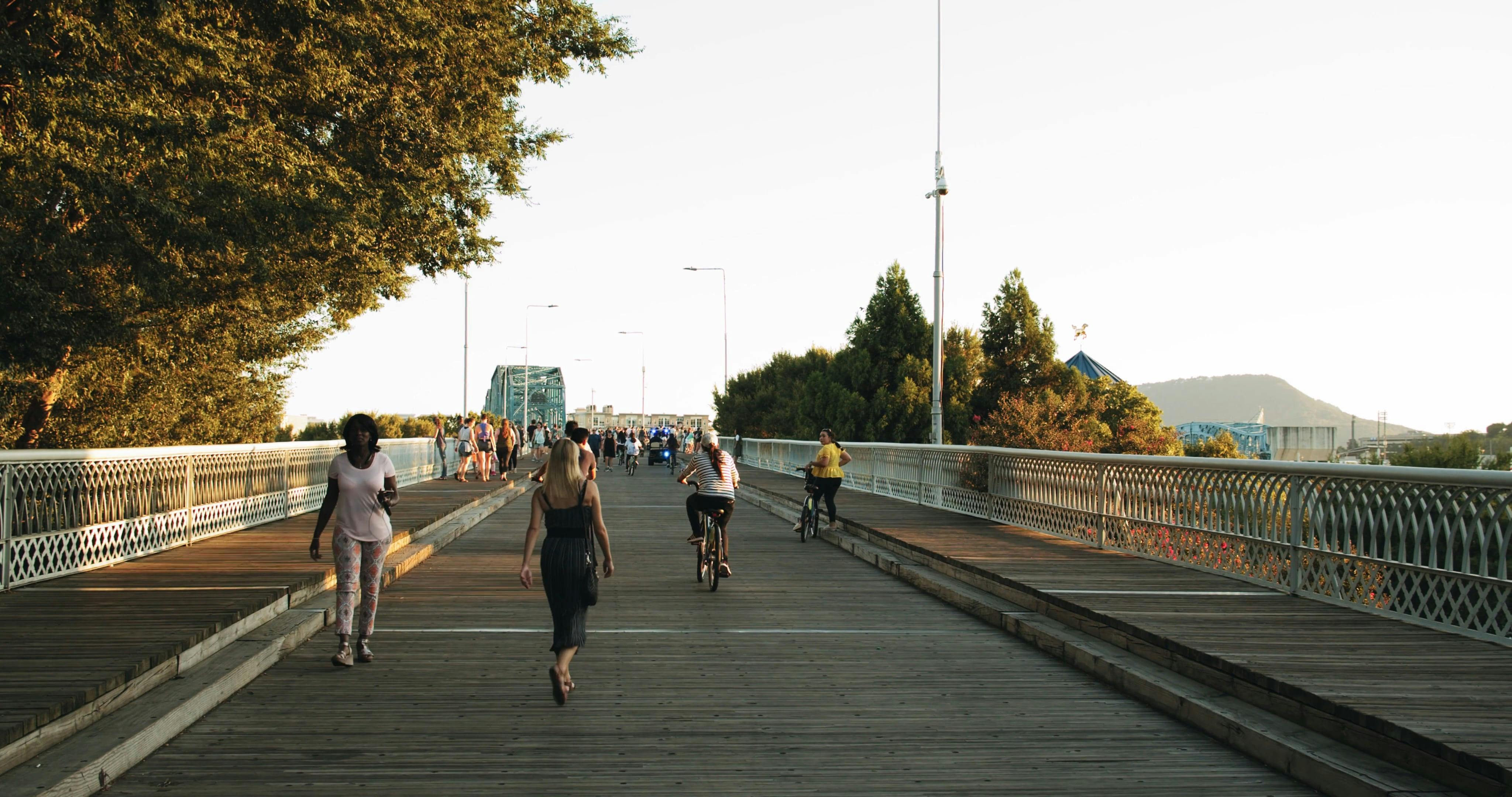 People Walking On A Footbridge · Free Stock Video