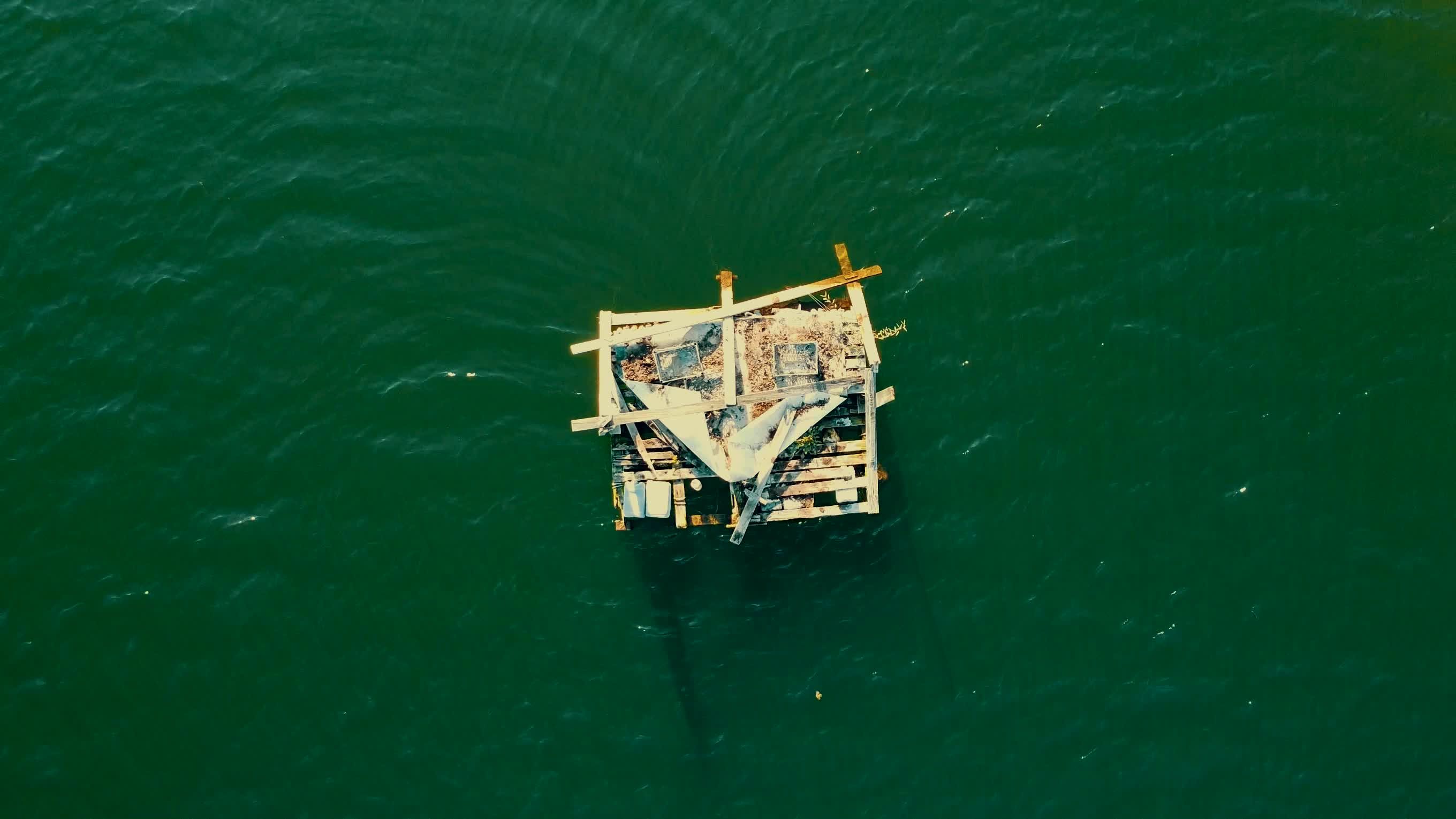 Aerial View of Rustic Raft in Open Water Free Stock Video Footage ...