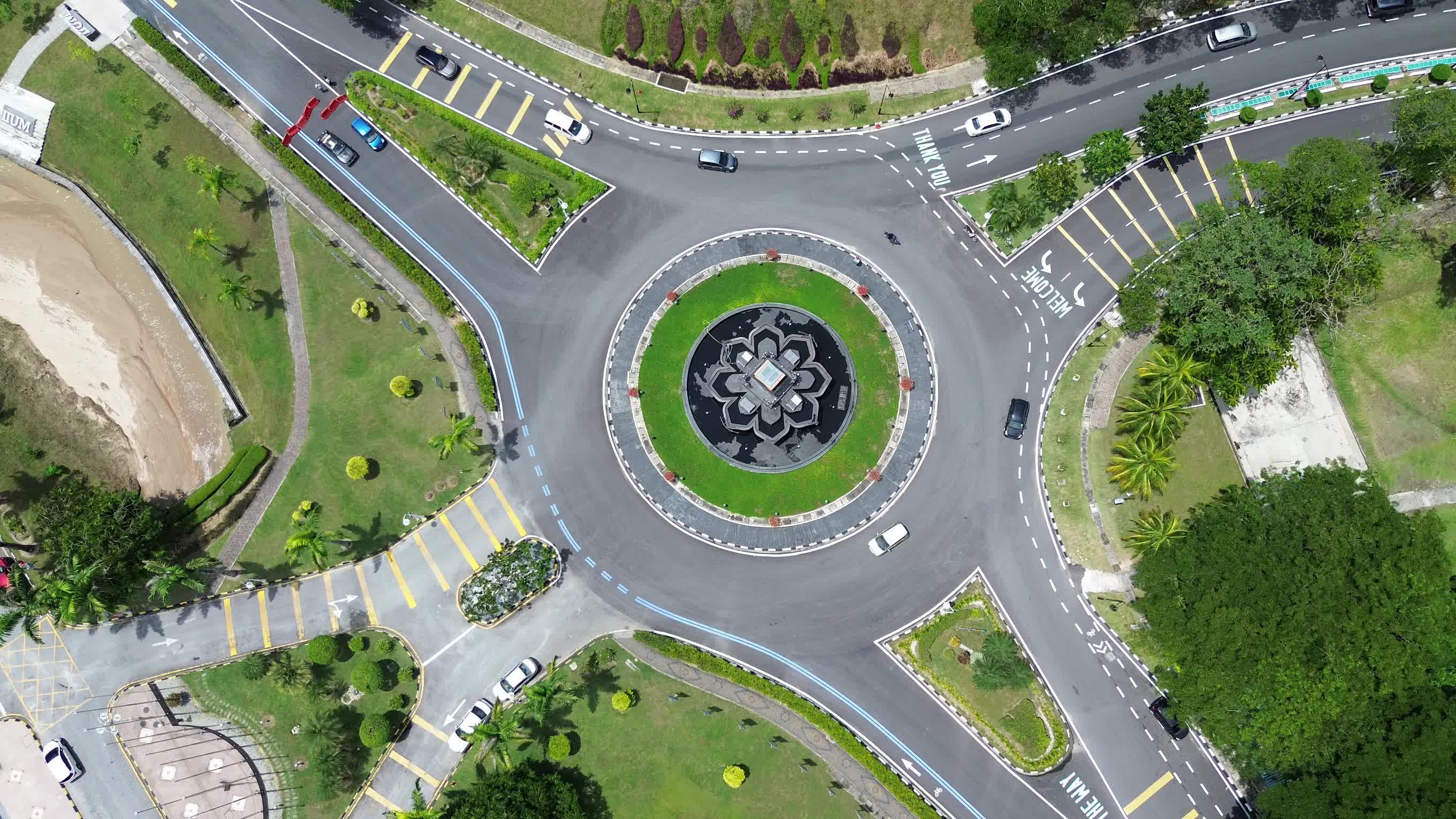 Aerial View of a Roundabout with Green Landscaping Free Stock Video ...