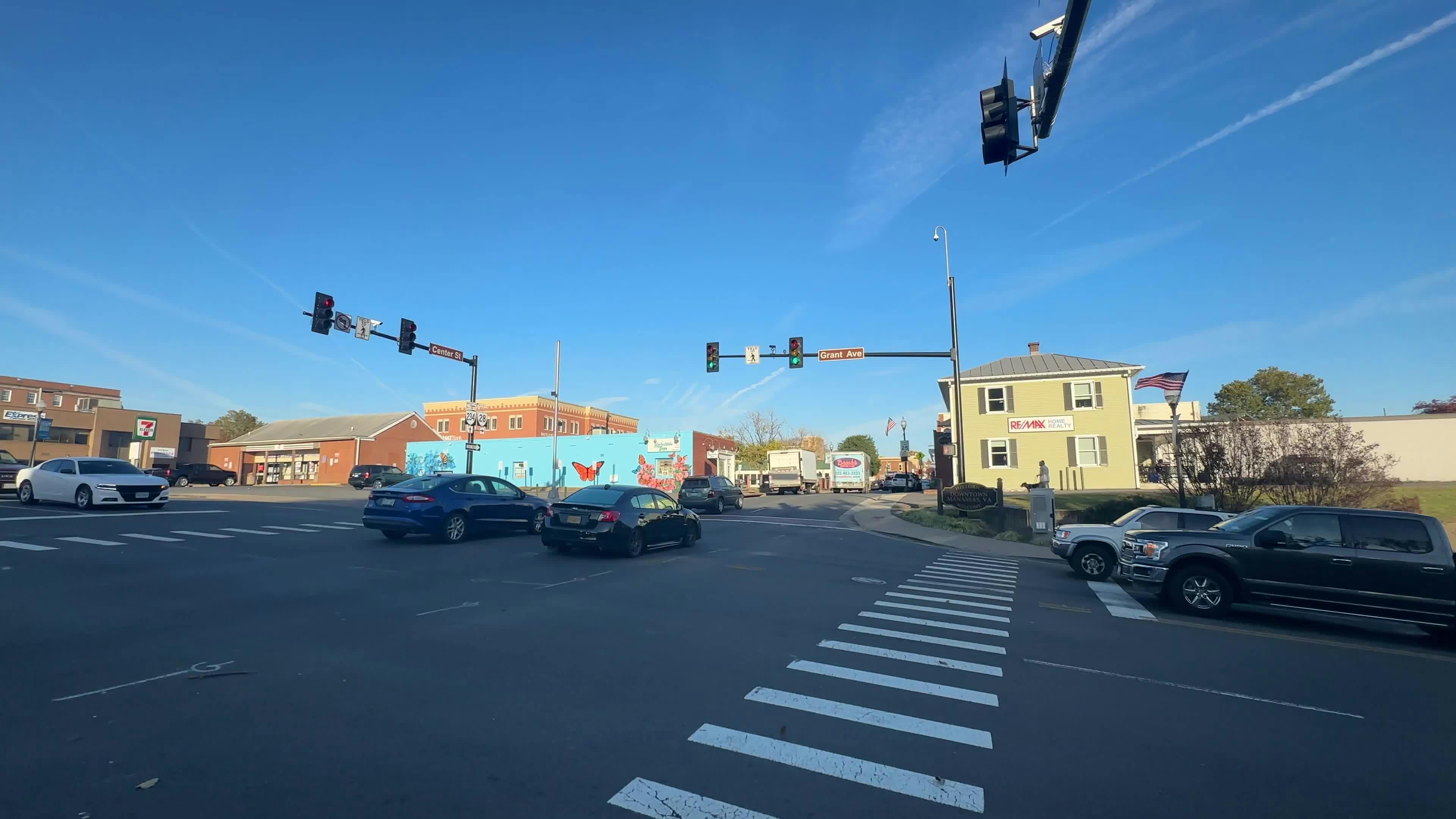 Busy City Intersection with Traffic and Murals Free Stock Video Footage ...