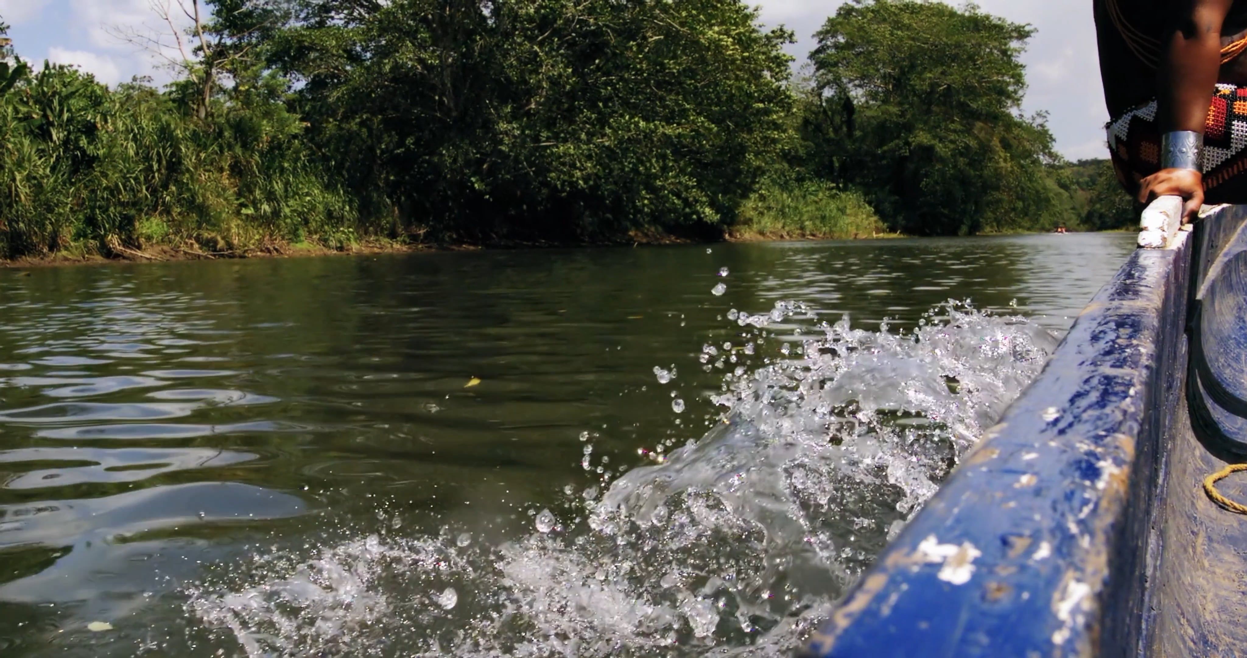 Slow Motion Footage Of Water Splashing From The Side Of A Moving Boat ...