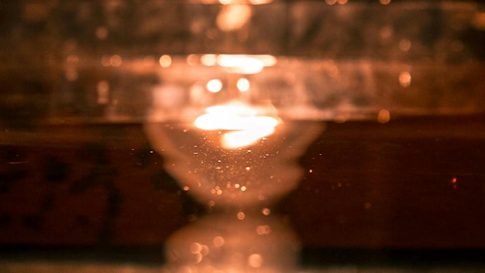 Slow Motion Footage Of Undulating Water Surface Reflecting The Light ...