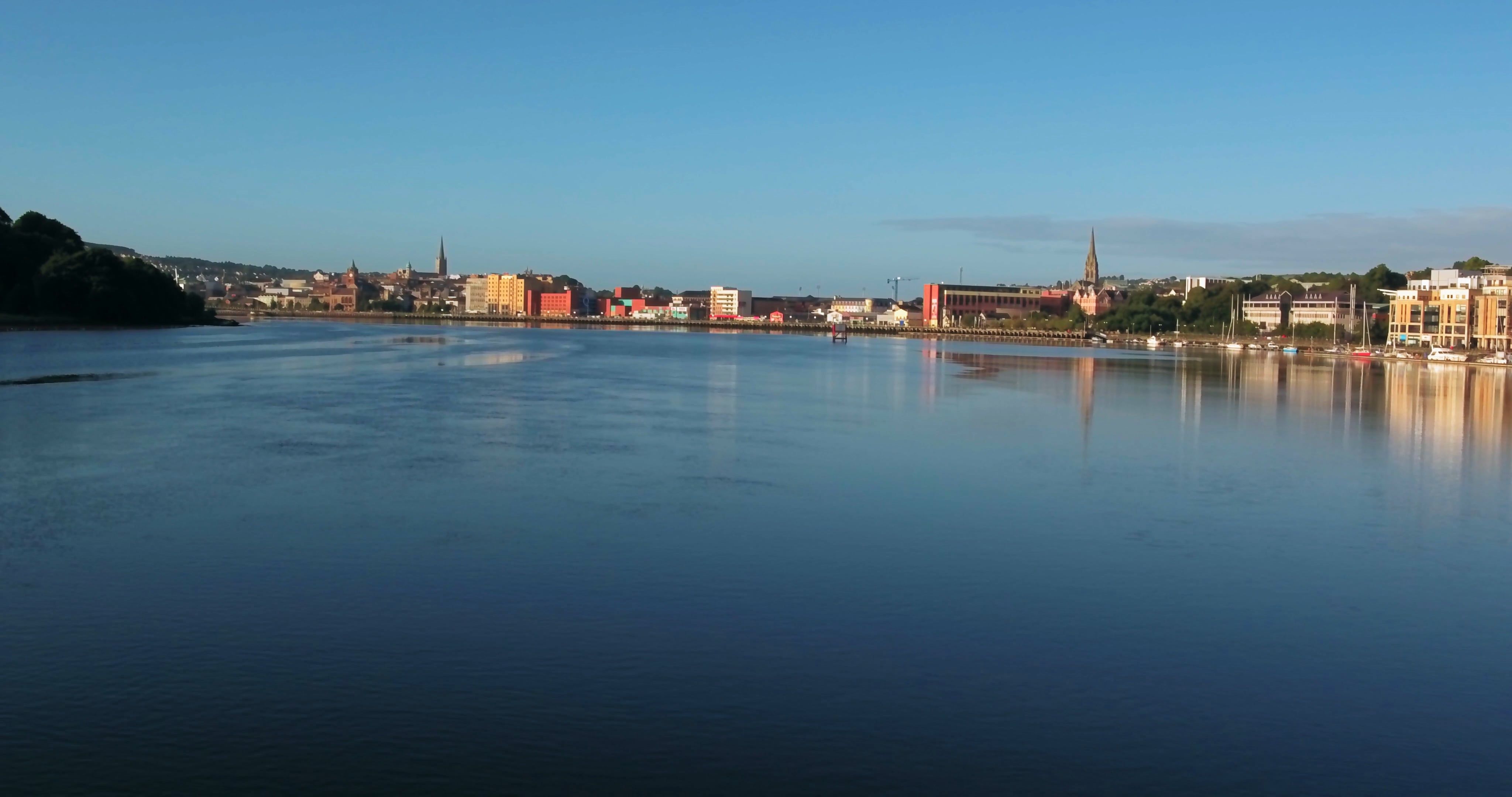 Drone Footage Of A River Channel And Structures On The Side Free Stock ...