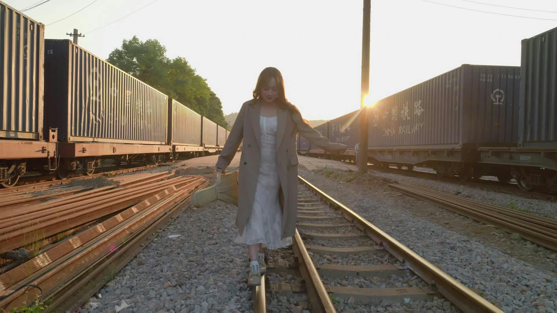 Woman Walking on Train Tracks at Sunset Free Stock Video Footage ...