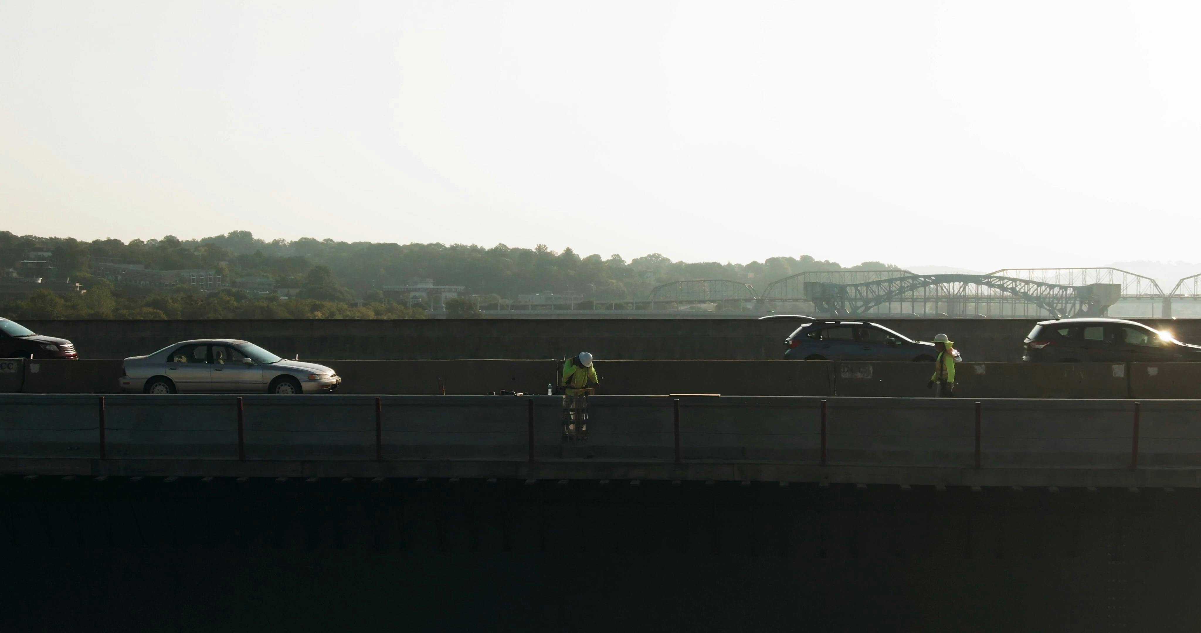 A Man Working On A Concrete Road Barrier Free Stock Video Footage ...
