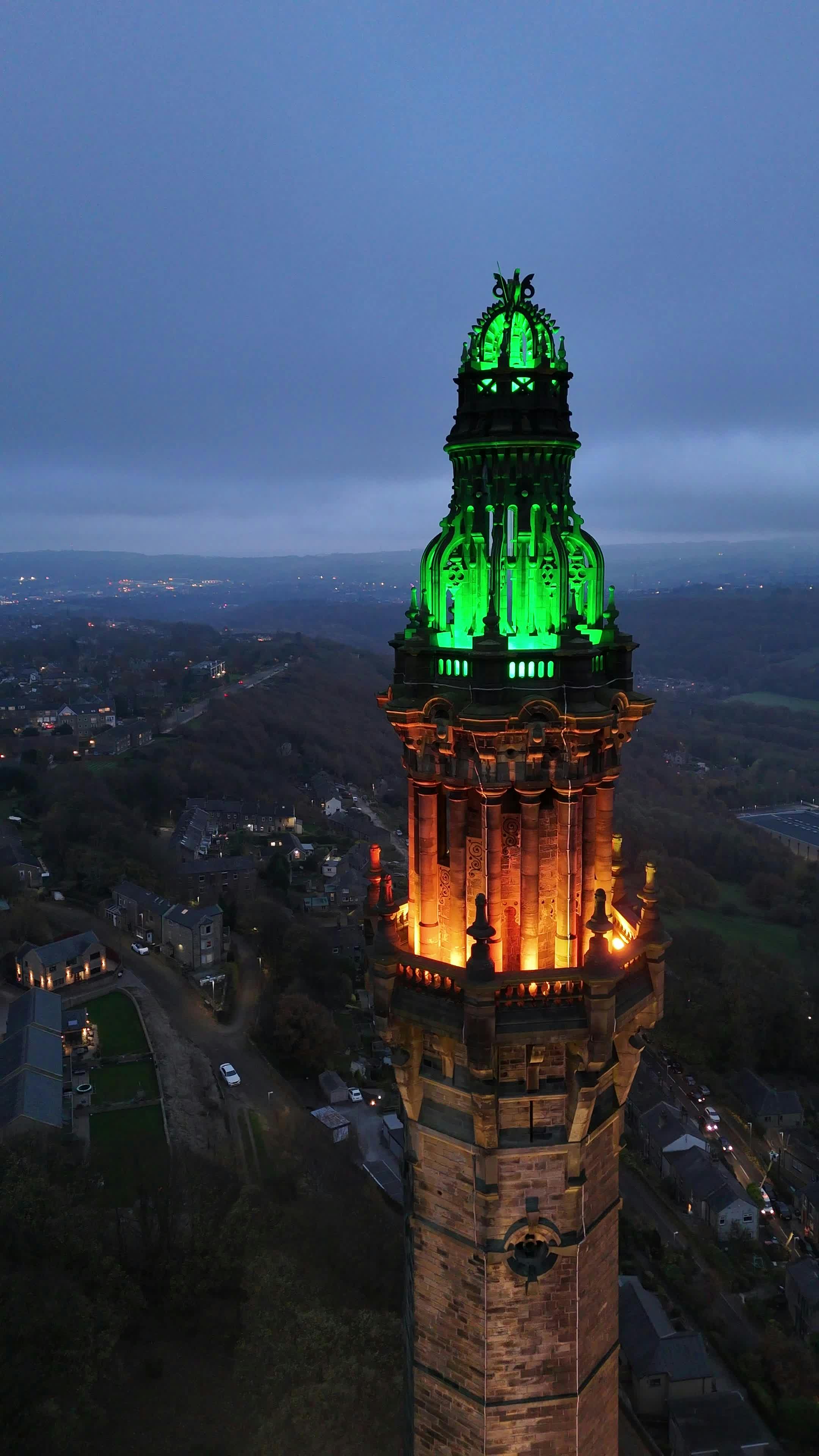 Colorful Lit Tower at Dusk Aerial View Free Stock Video Footage ...