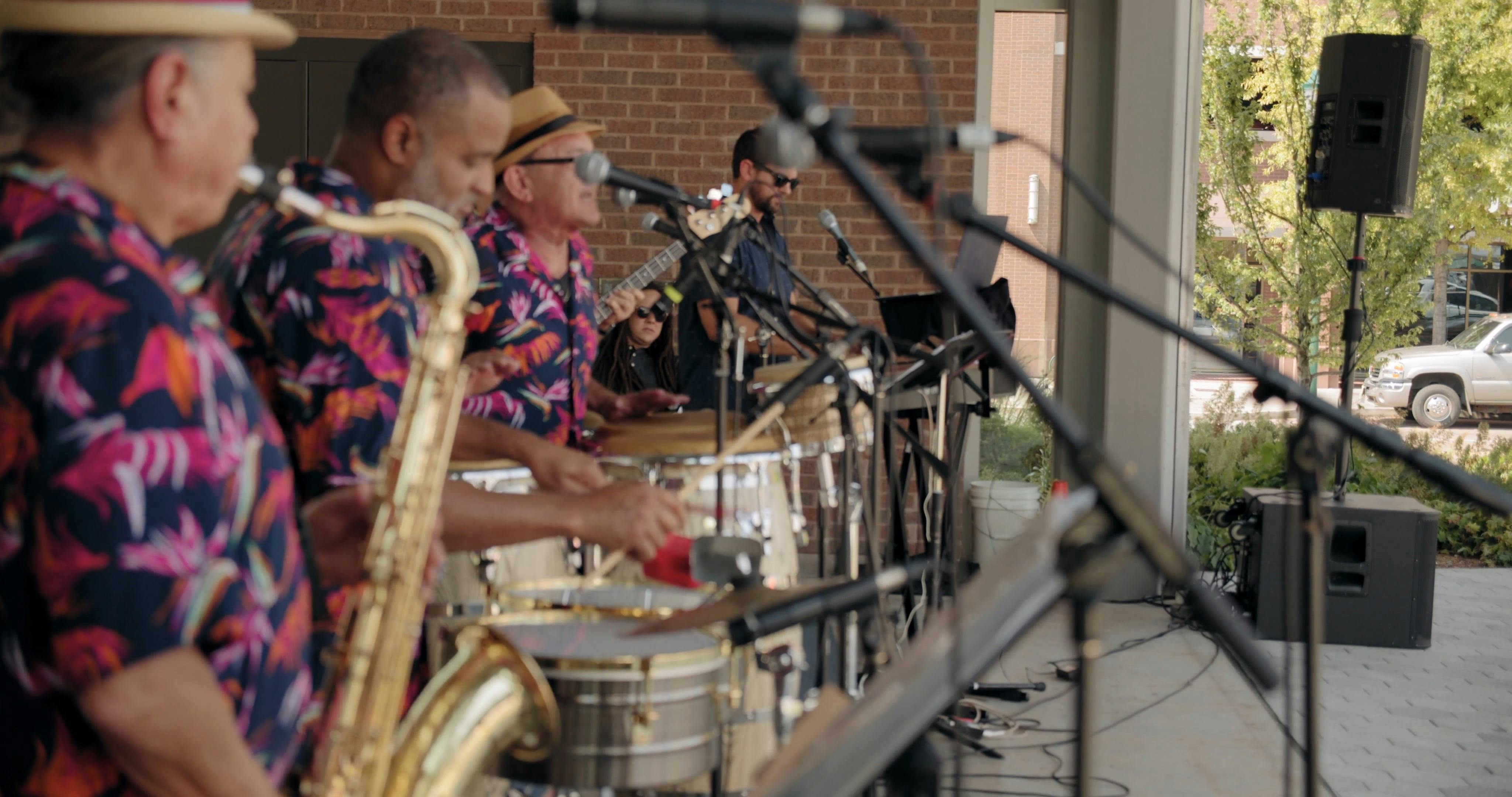 A Group Of Musicians Performing On A Stage Free Stock Video Footage ...
