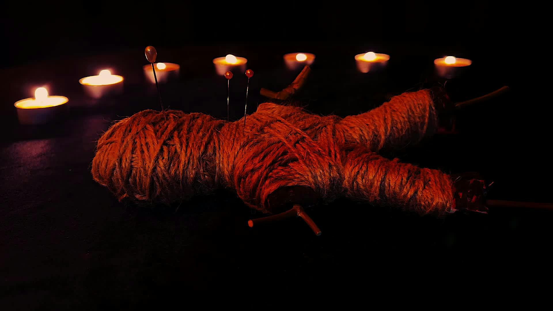 Mysterious Voodoo Doll Ritual with Candles Free Stock Video Footage ...