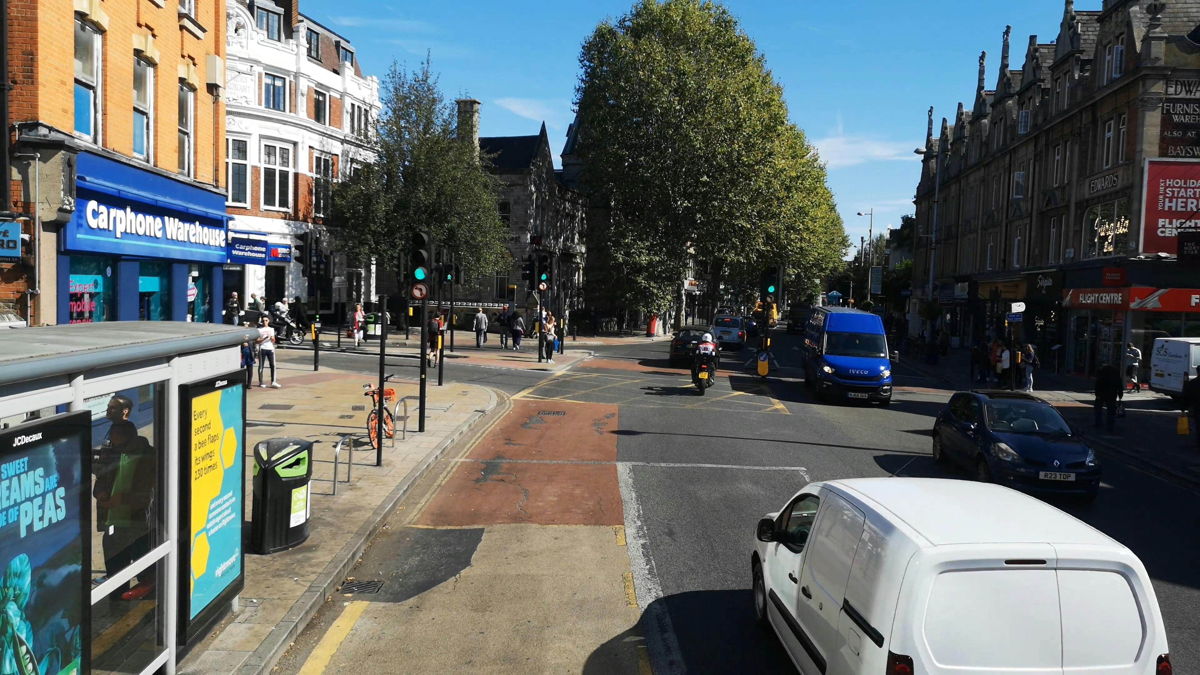 A Busy Street On A Business District At Daytime · Free Stock Video