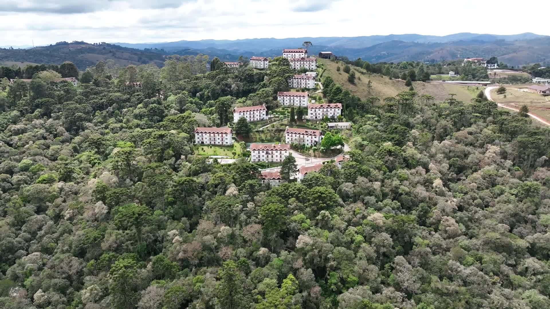 Scenic Aerial View of Hillside Buildings in Lush Forest Free Stock ...