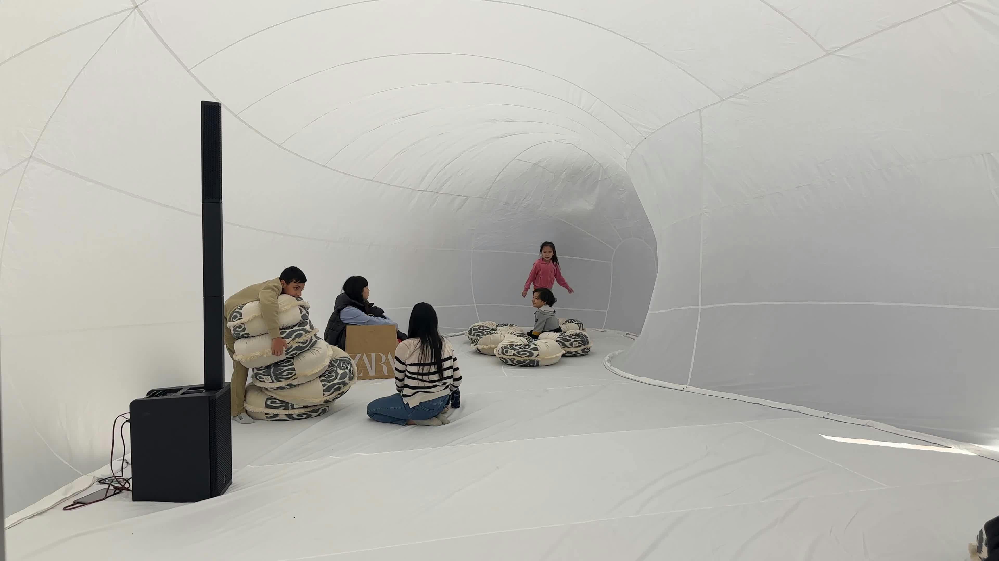 People Enjoying Speaker Music in Inflatable Room Free Stock Video ...