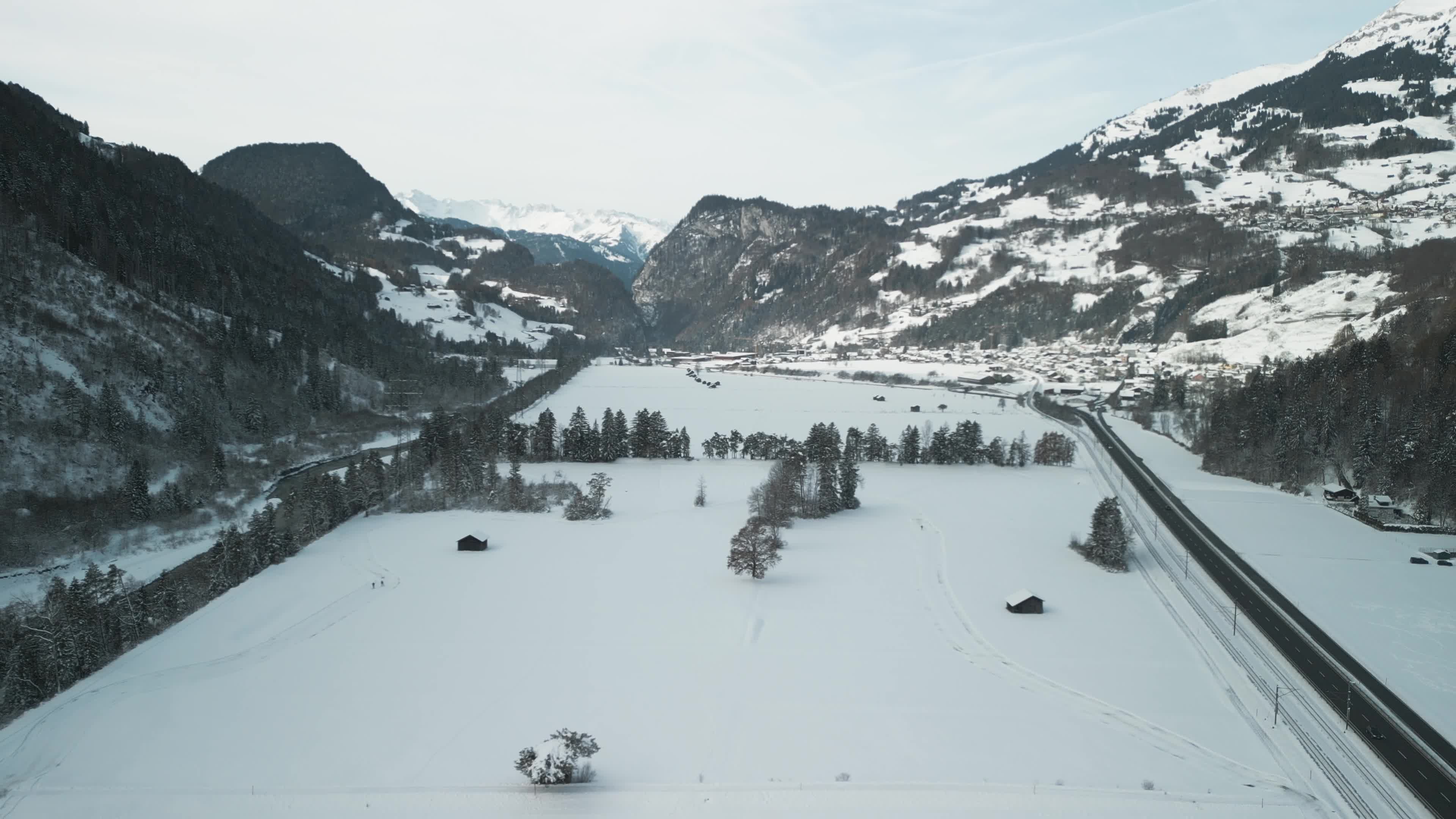 Aerial View of Snow-Covered Mountain Valley Free Stock Video Footage ...