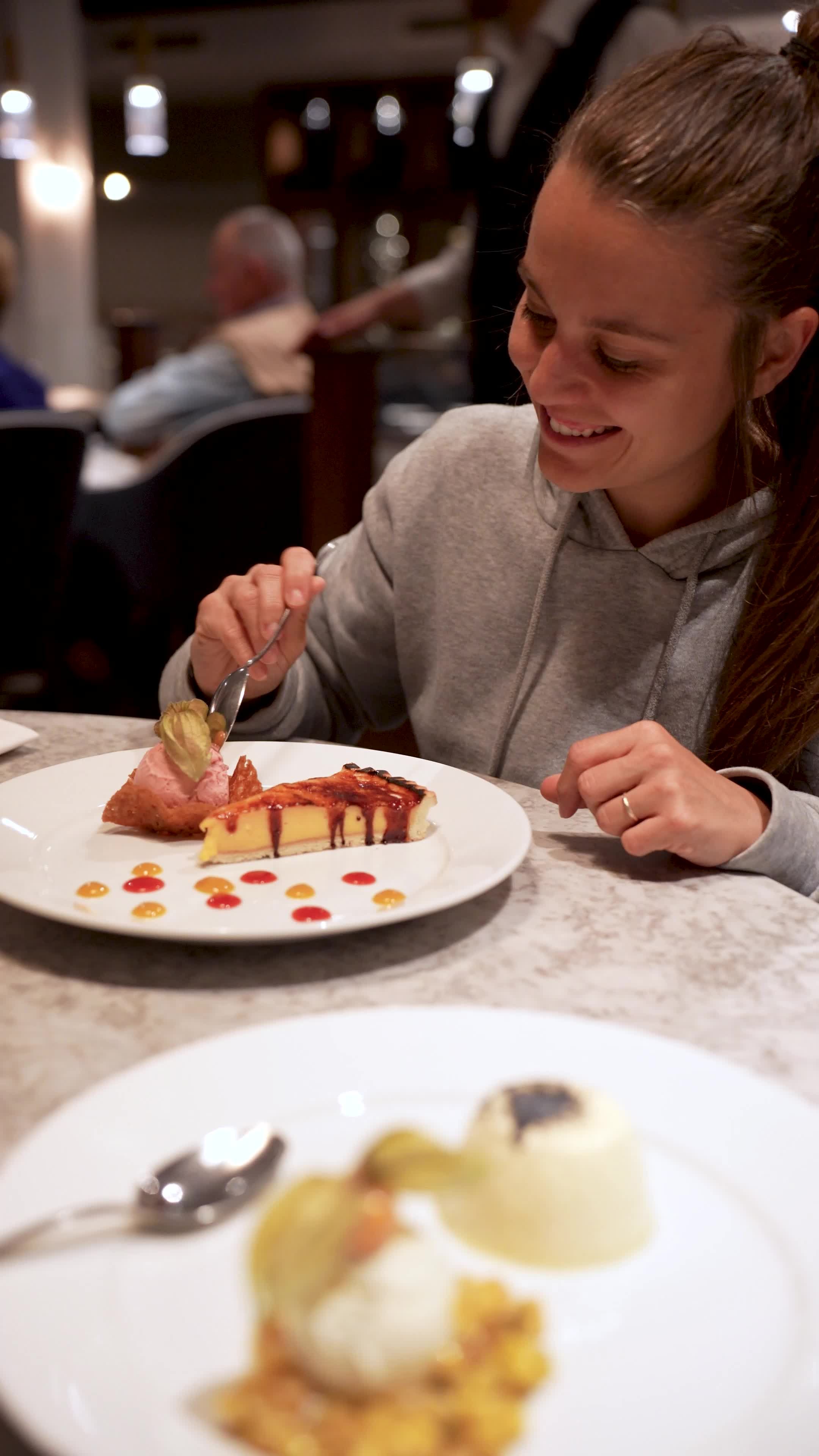 Young Woman Enjoying Gourmet Dessert at Restaurant Free Stock Video ...