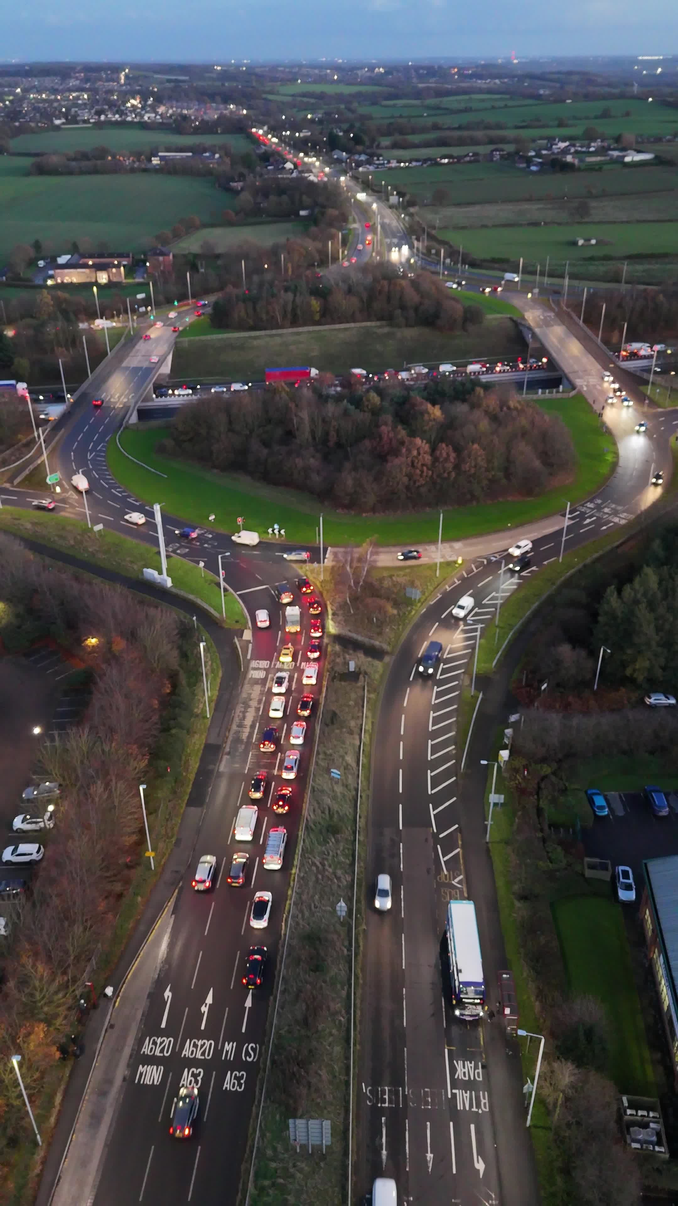 Aerial View of Busy Roundabout at Dusk Free Stock Video Footage ...