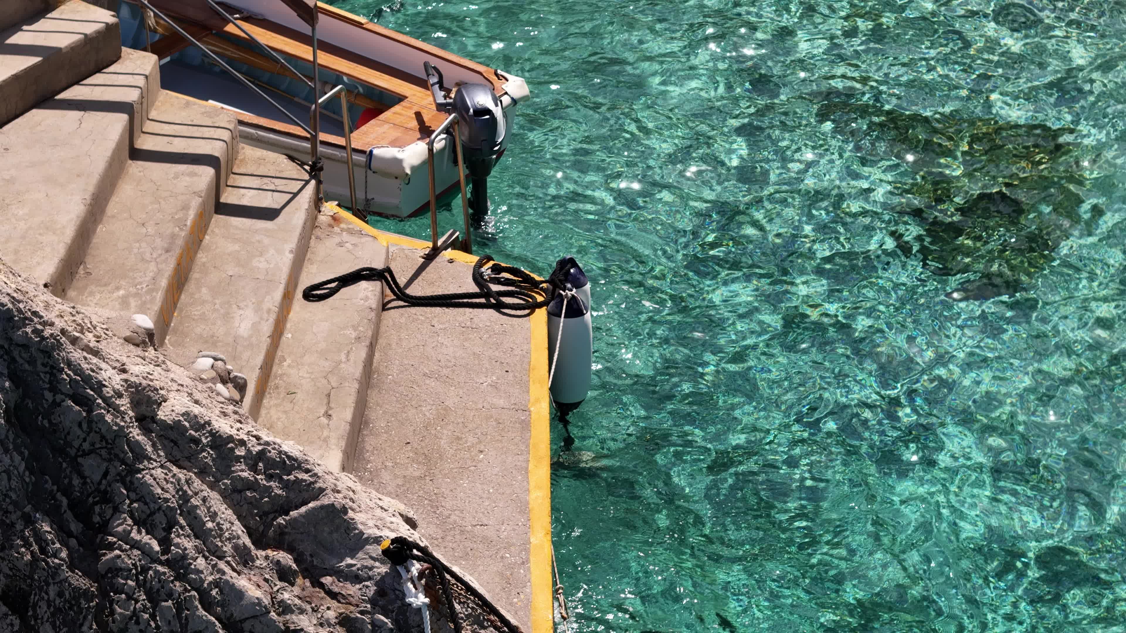 Drone View of Clear Water and Rocky Dock Free Stock Video Footage ...