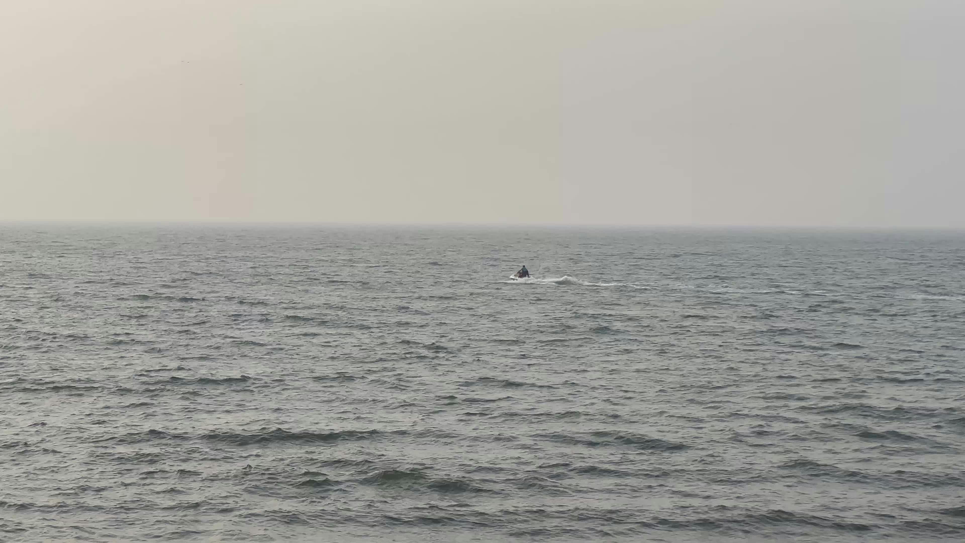 Calm Sea with Distant Boat on Overcast Day Free Stock Video Footage ...