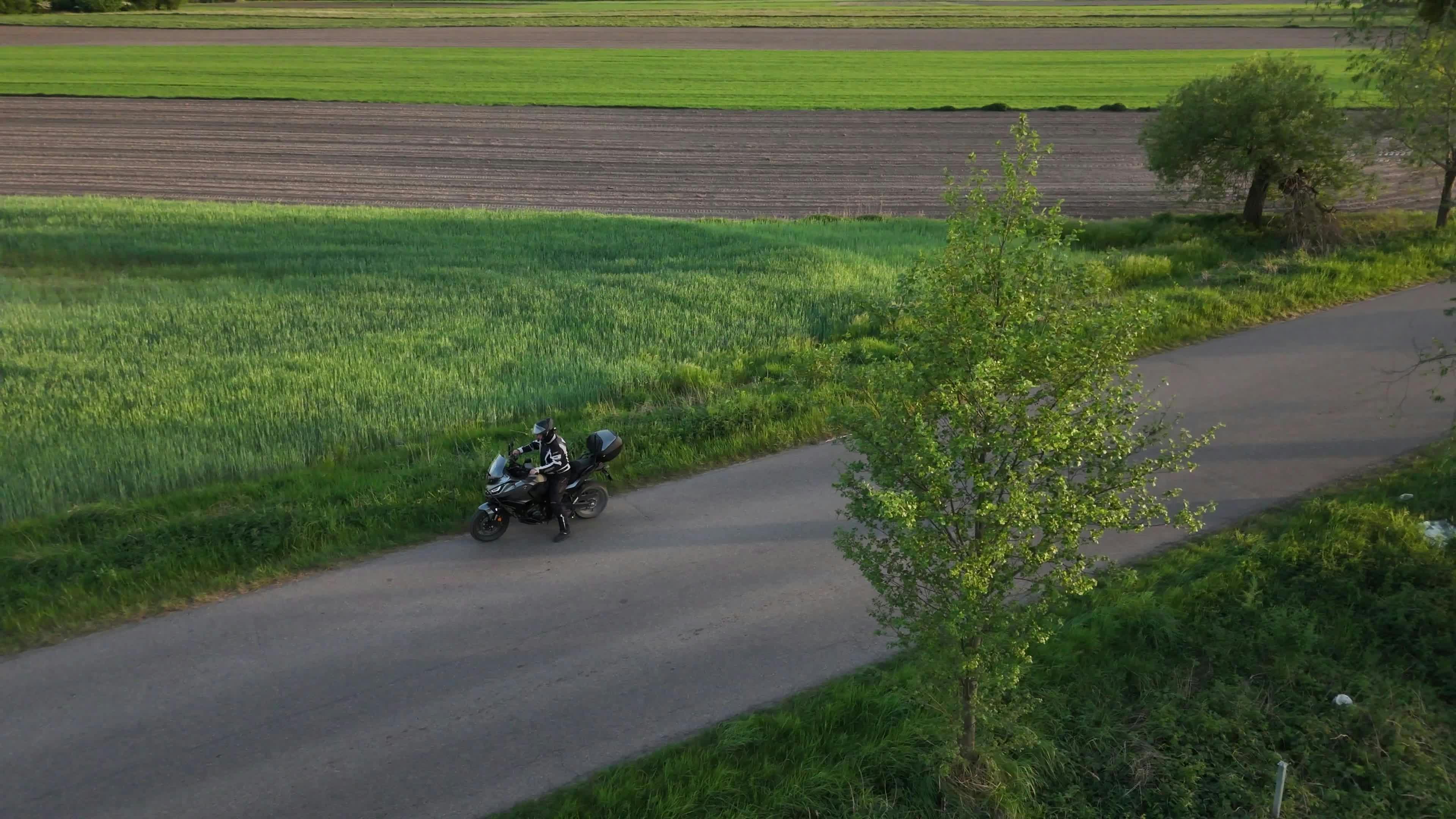 Drone Footage of Motorcycle on Country Road Free Stock Video Footage ...