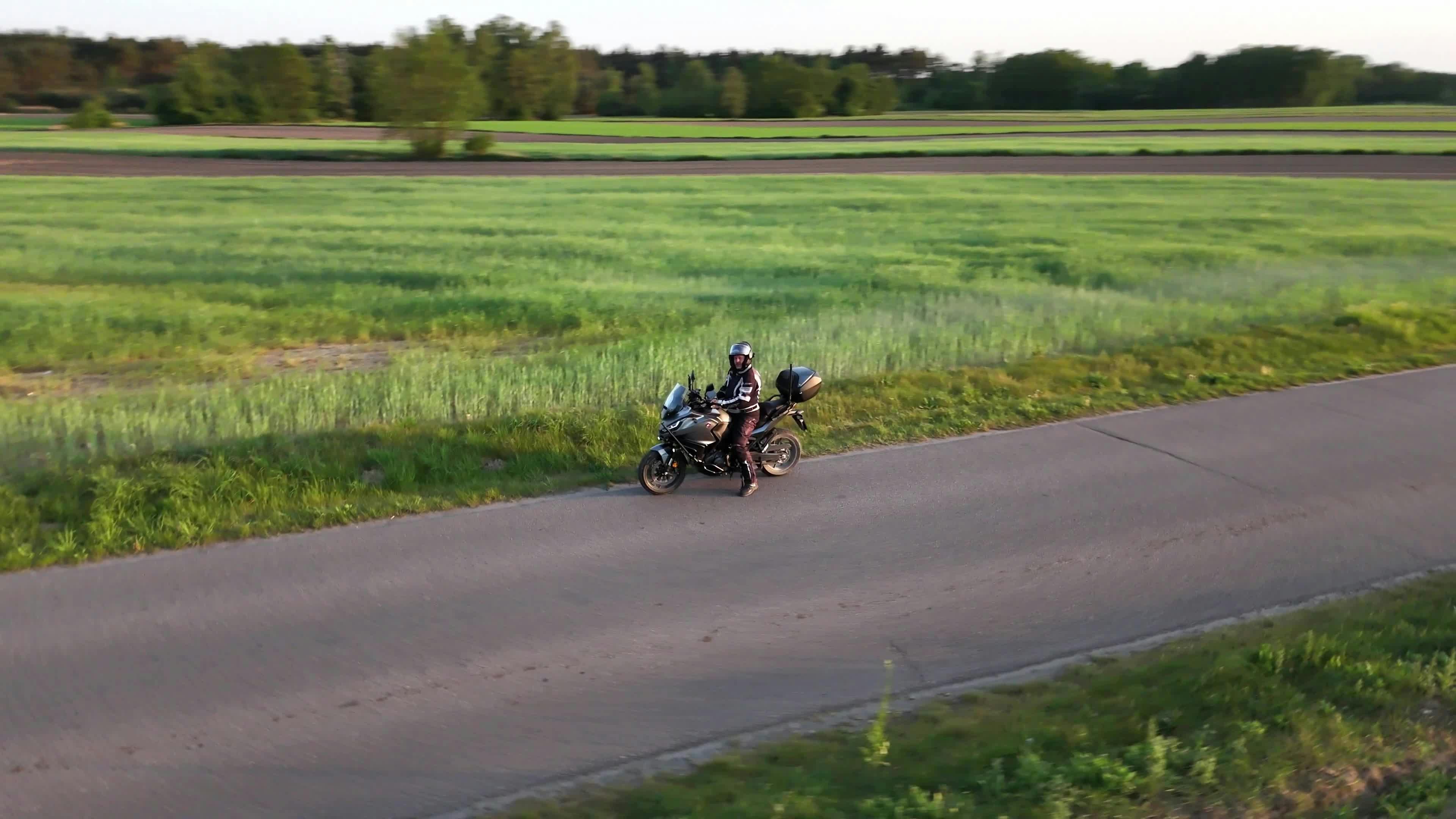 Motorcycle Riders Speeding On A Long And Winding Road Free Stock Video ...