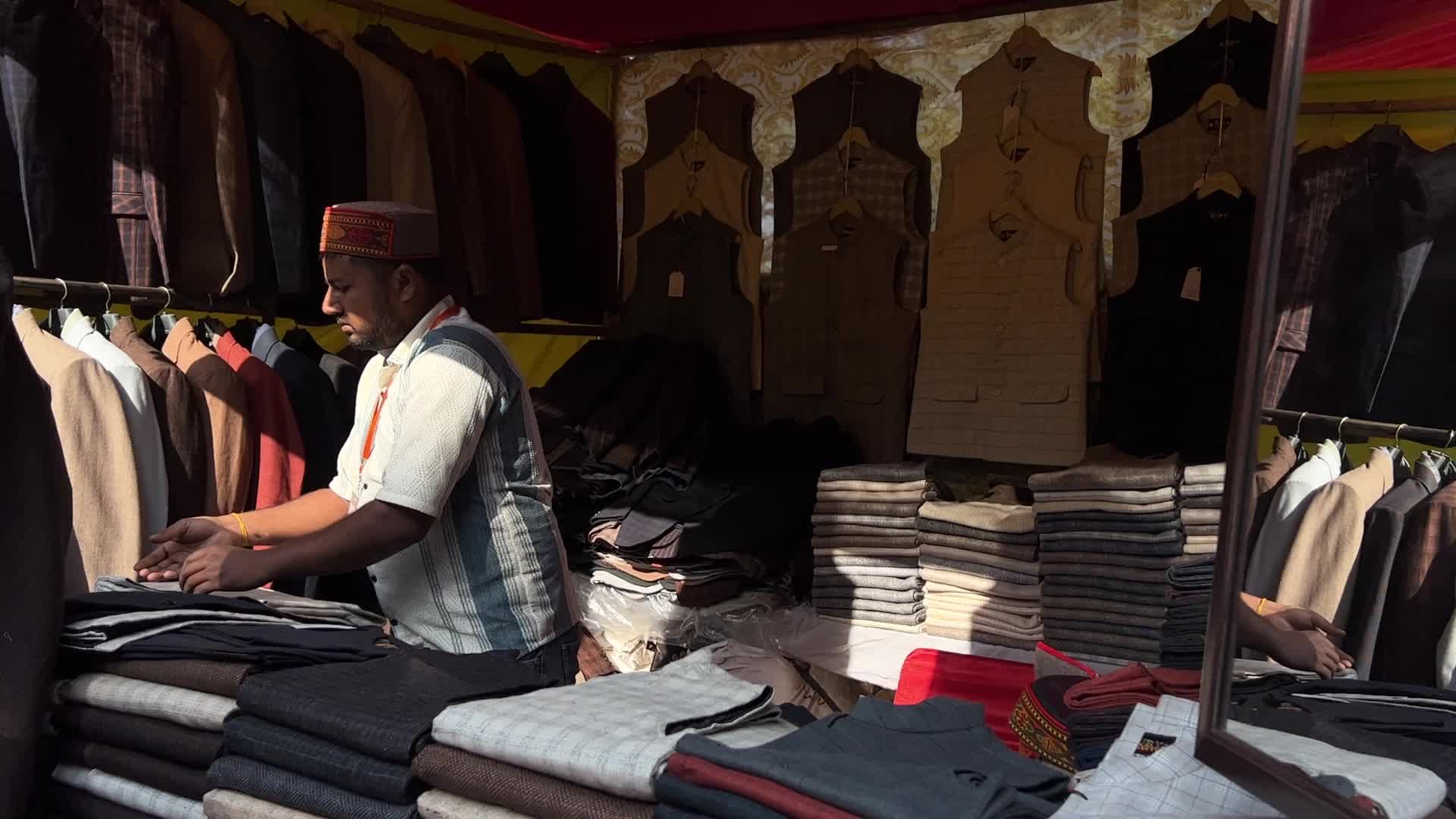 Outdoor Market Stall with Traditional Clothing Display Free Stock Video ...