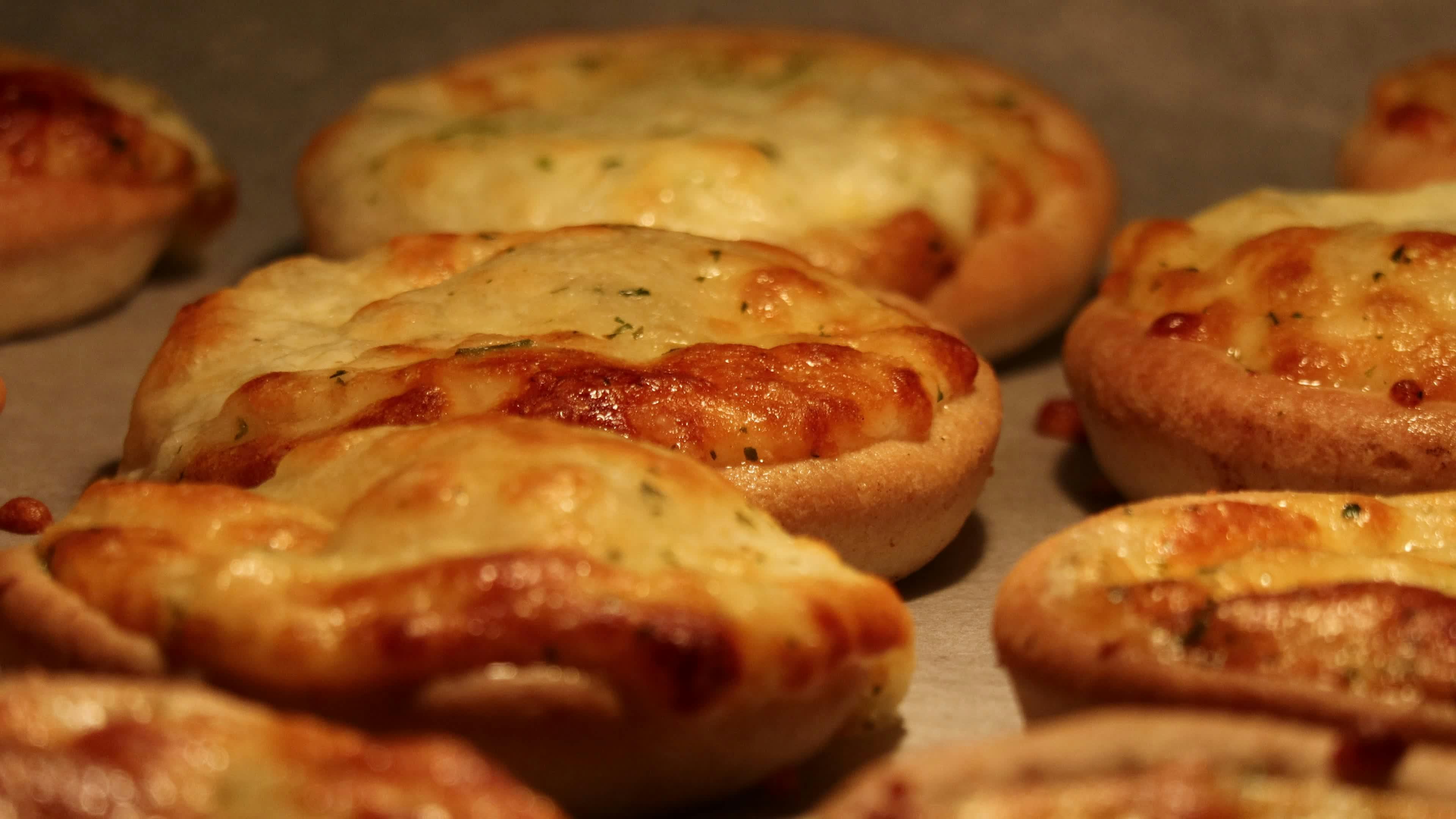 Cheesy Mini Pizzas Freshly Baked in Oven Free Stock Video Footage ...