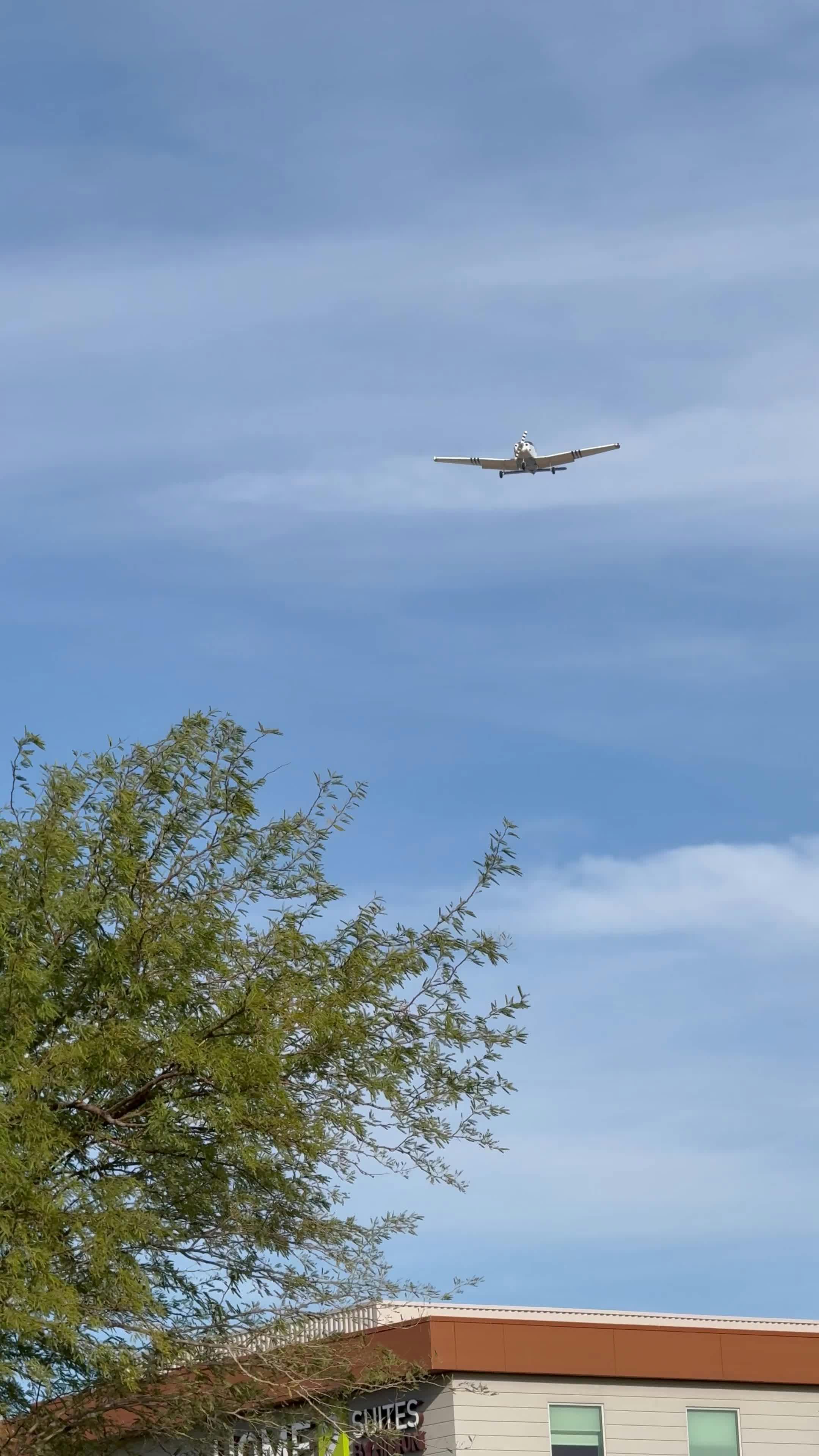 Airplane Flying Over Tree and Building Free Stock Video Footage ...