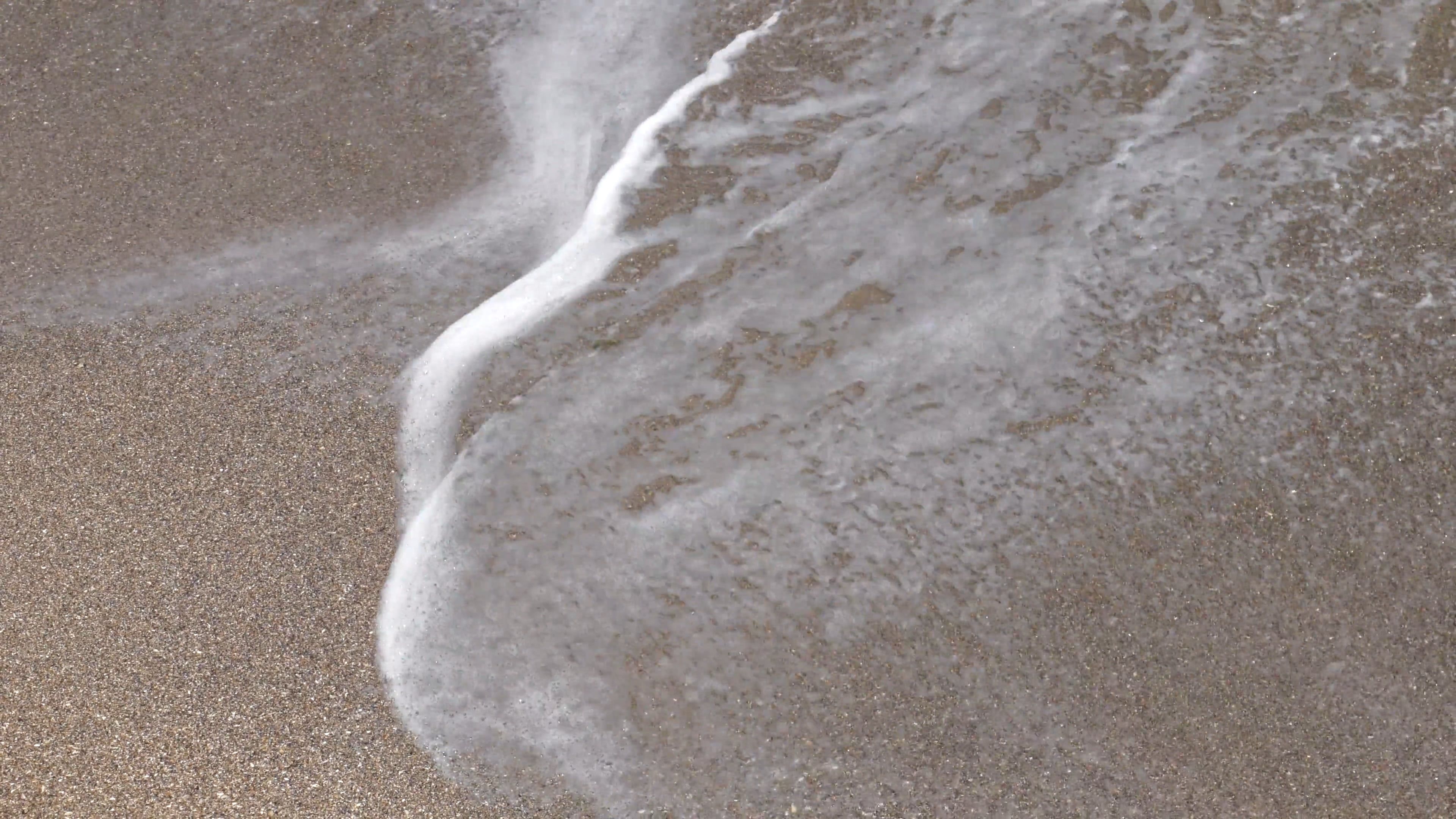 Slow Motion Footage Of Waves Breaking On Sandy Seashore Free Stock ...