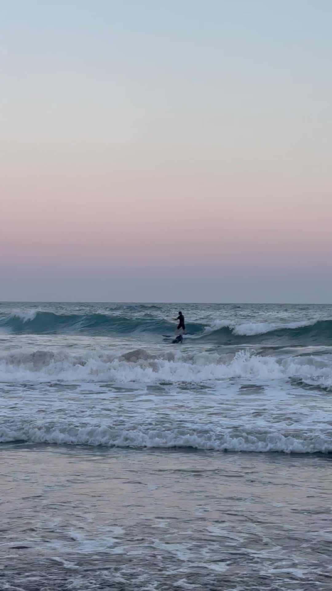 Surfer Riding Early Morning Waves at Scenic Beach Free Stock Video ...