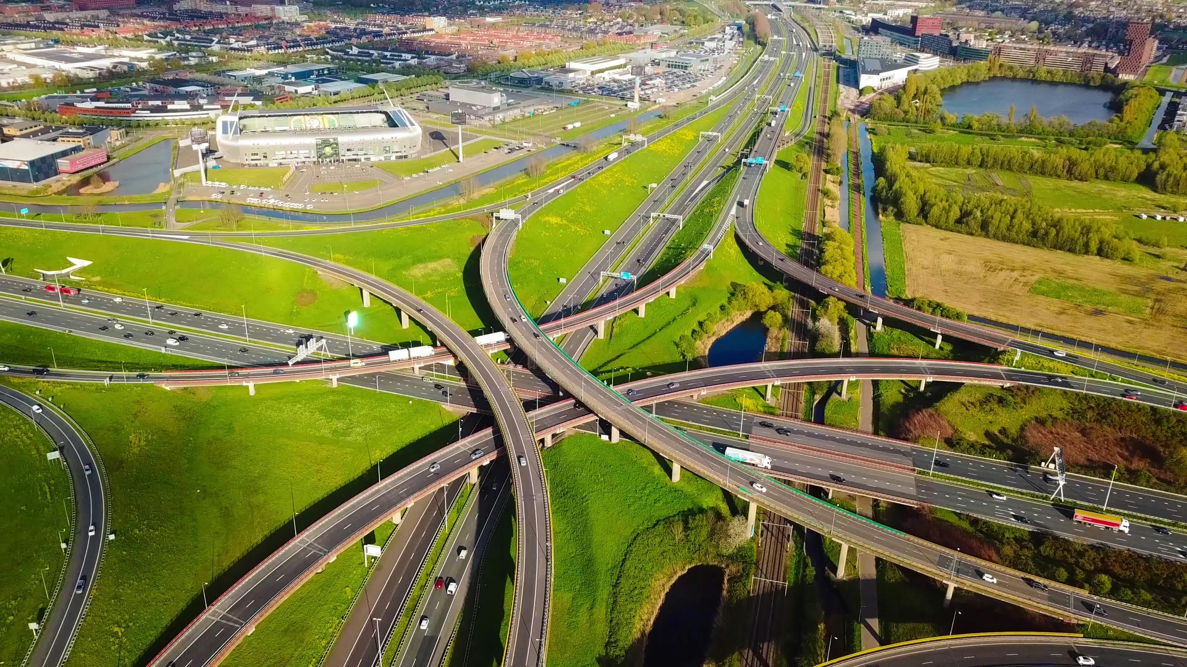 Aerial View of Busy Highway Interchange at Sunset Free Stock Video ...