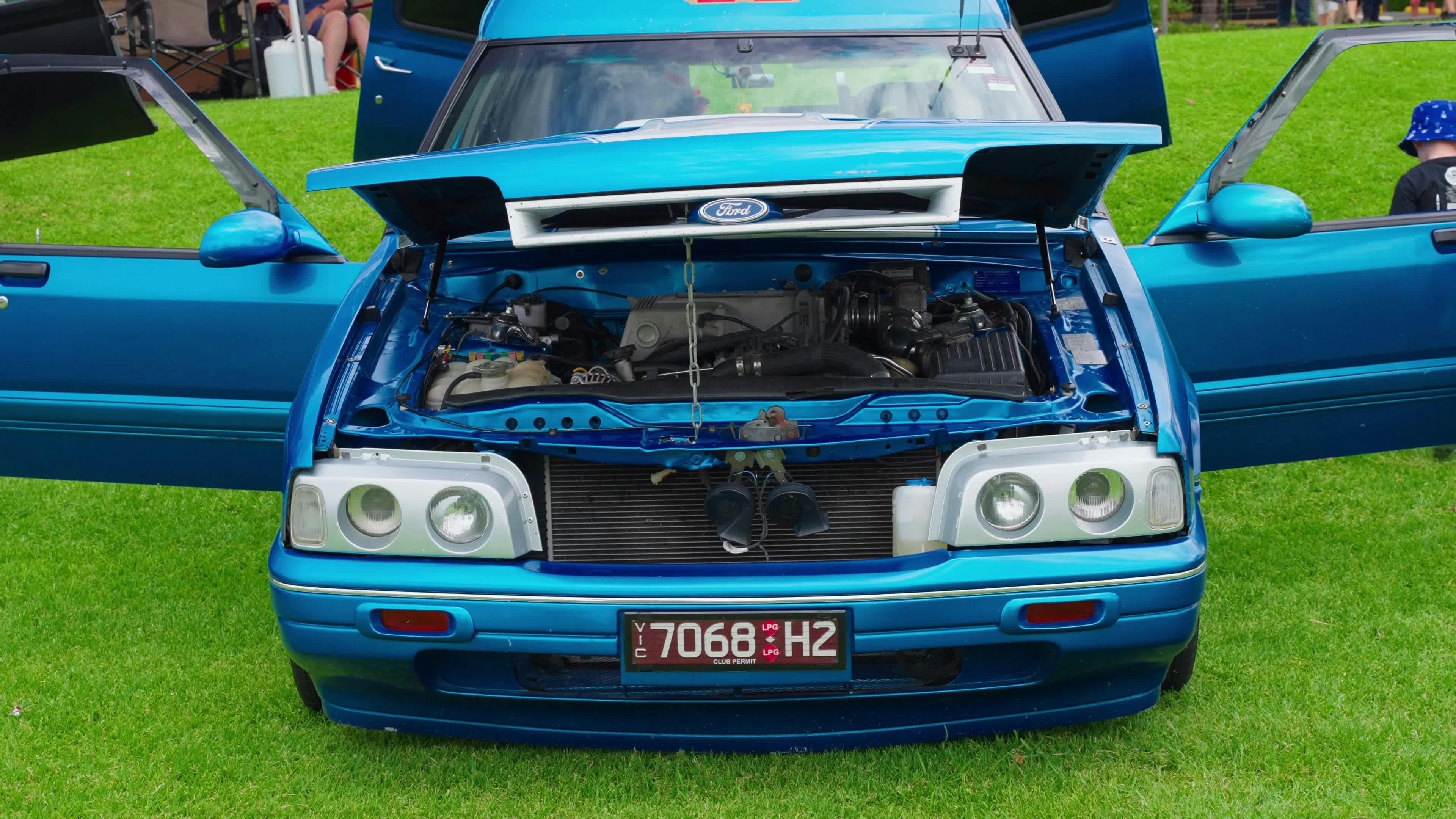 Close-up Of The Front End Of A Parked Classic Car With Its Engine ...