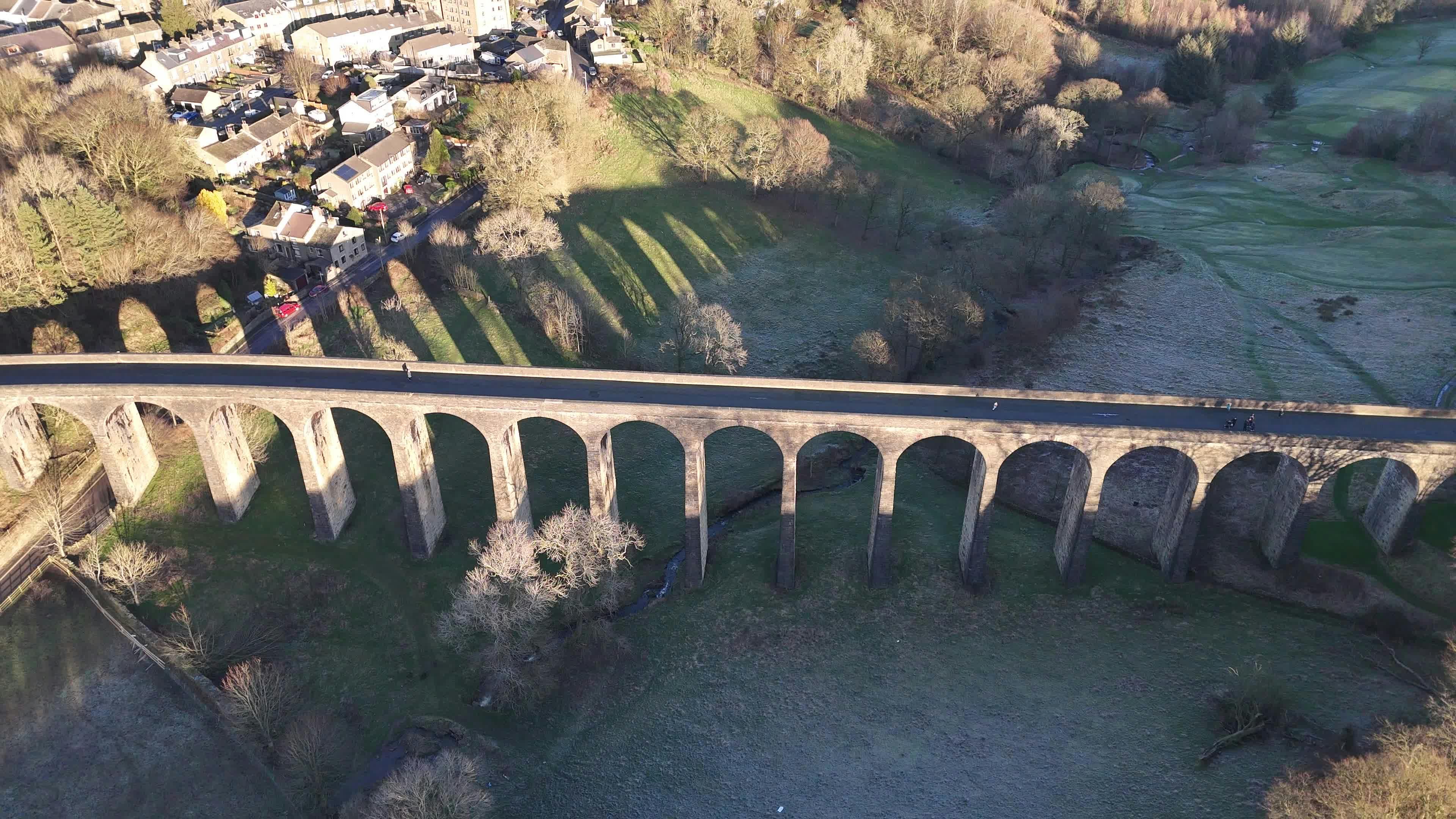 Aerial View of Arched Viaduct Over Lush Valley Free Stock Video Footage ...