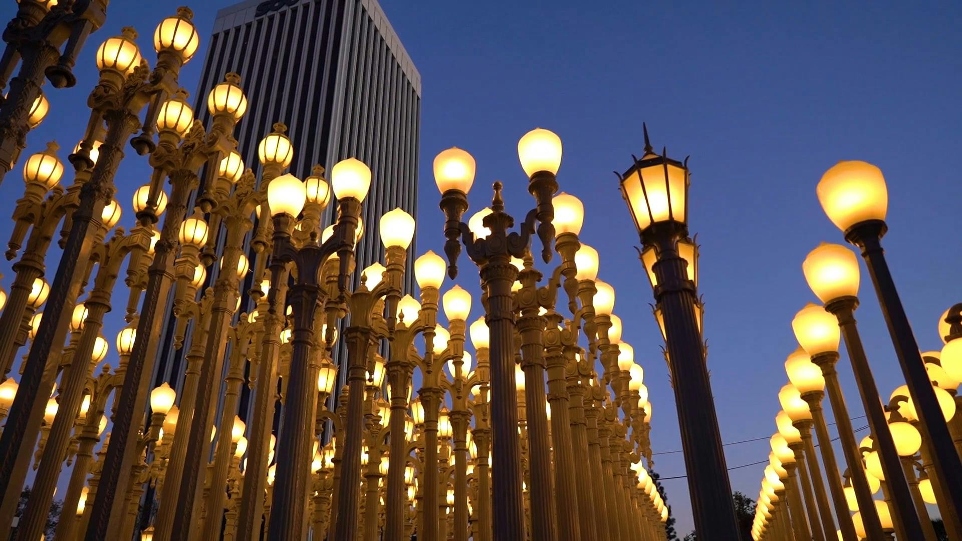 Low Angle Shot Of Rows Of A Variety Of Illuminated Lamp Post Free Stock ...