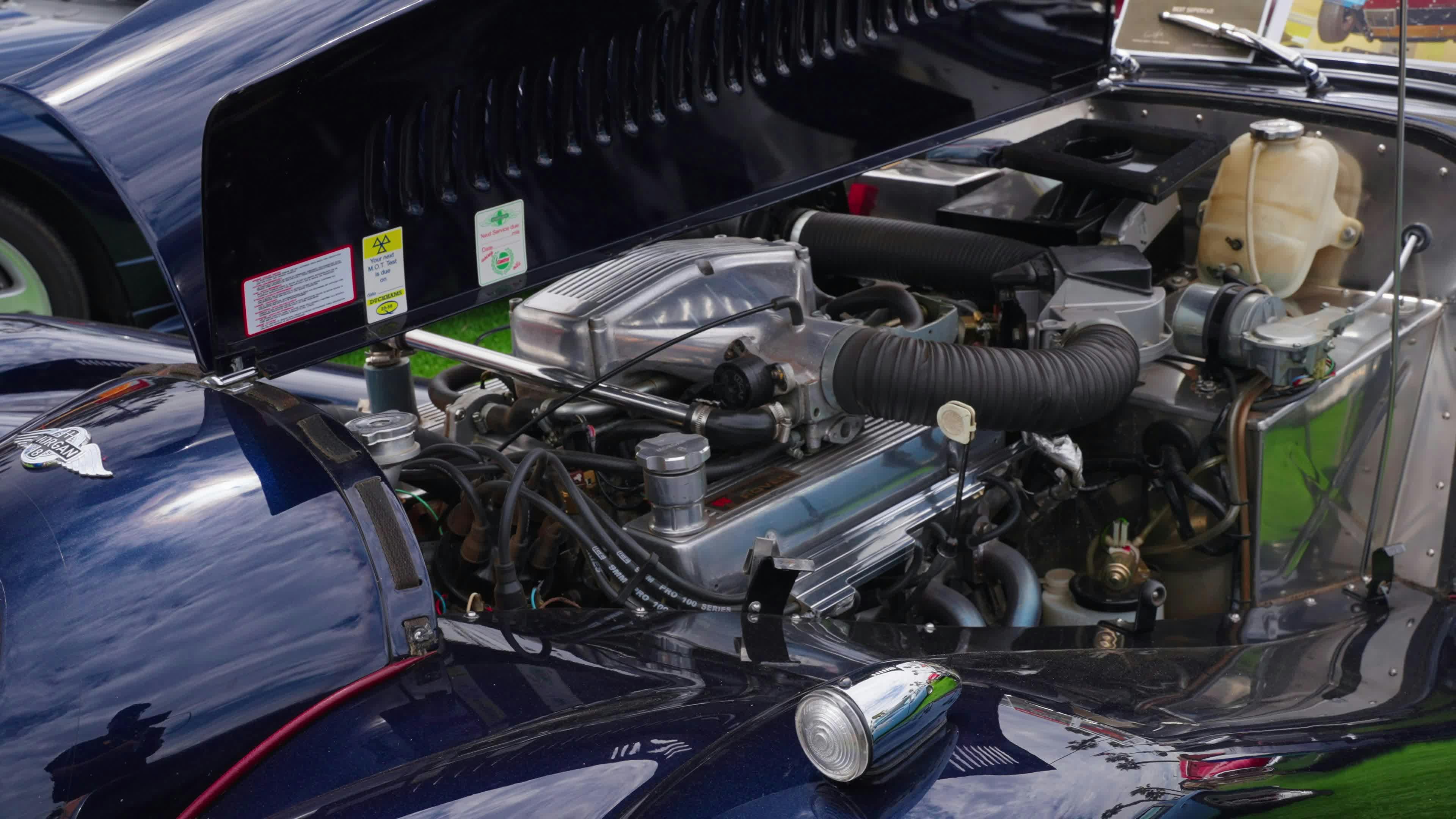 Close-up Of The Front End Of A Parked Classic Car With Its Engine ...