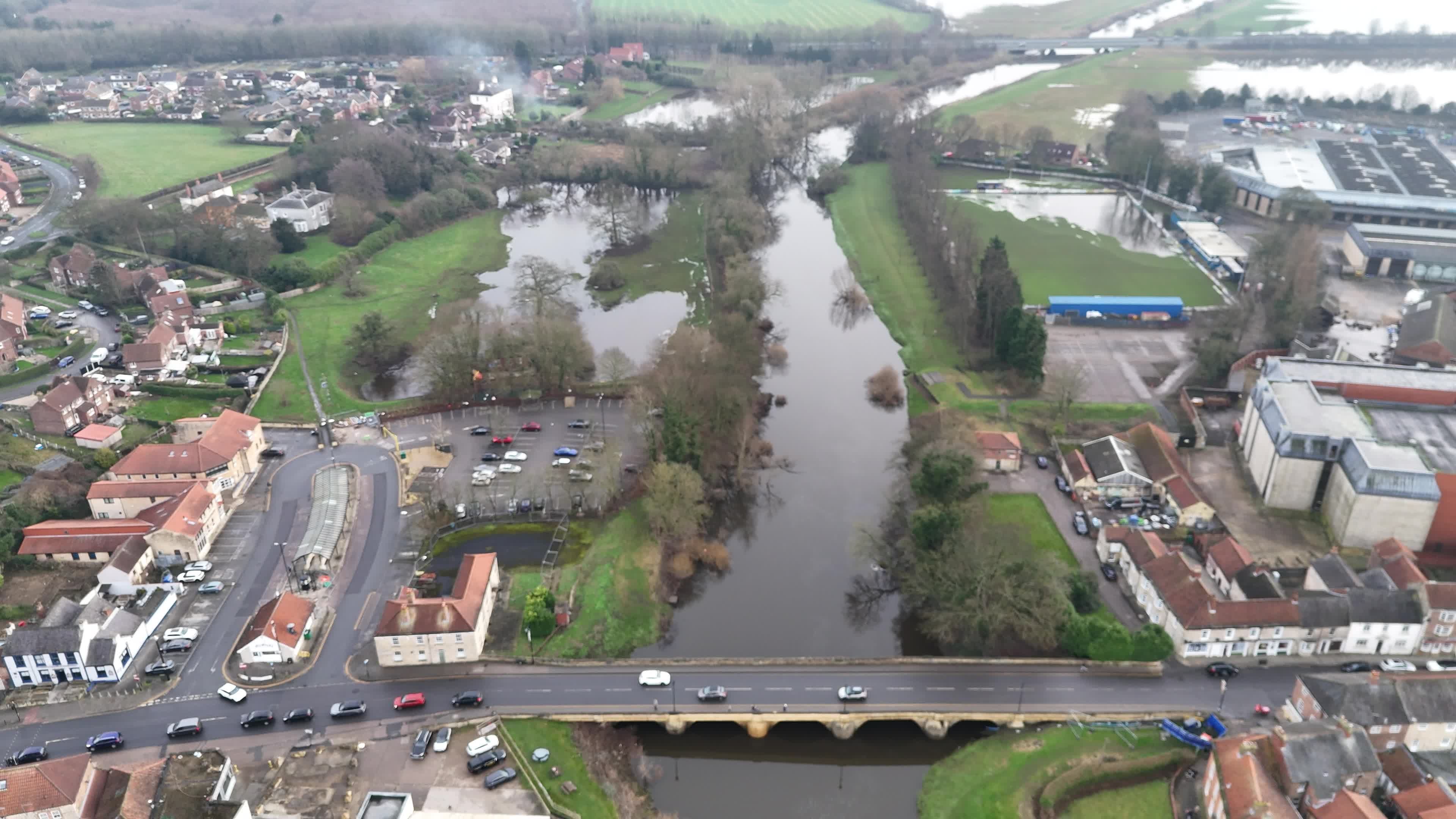 Aerial View of Scenic Riverside Town and Countryside Free Stock Video ...