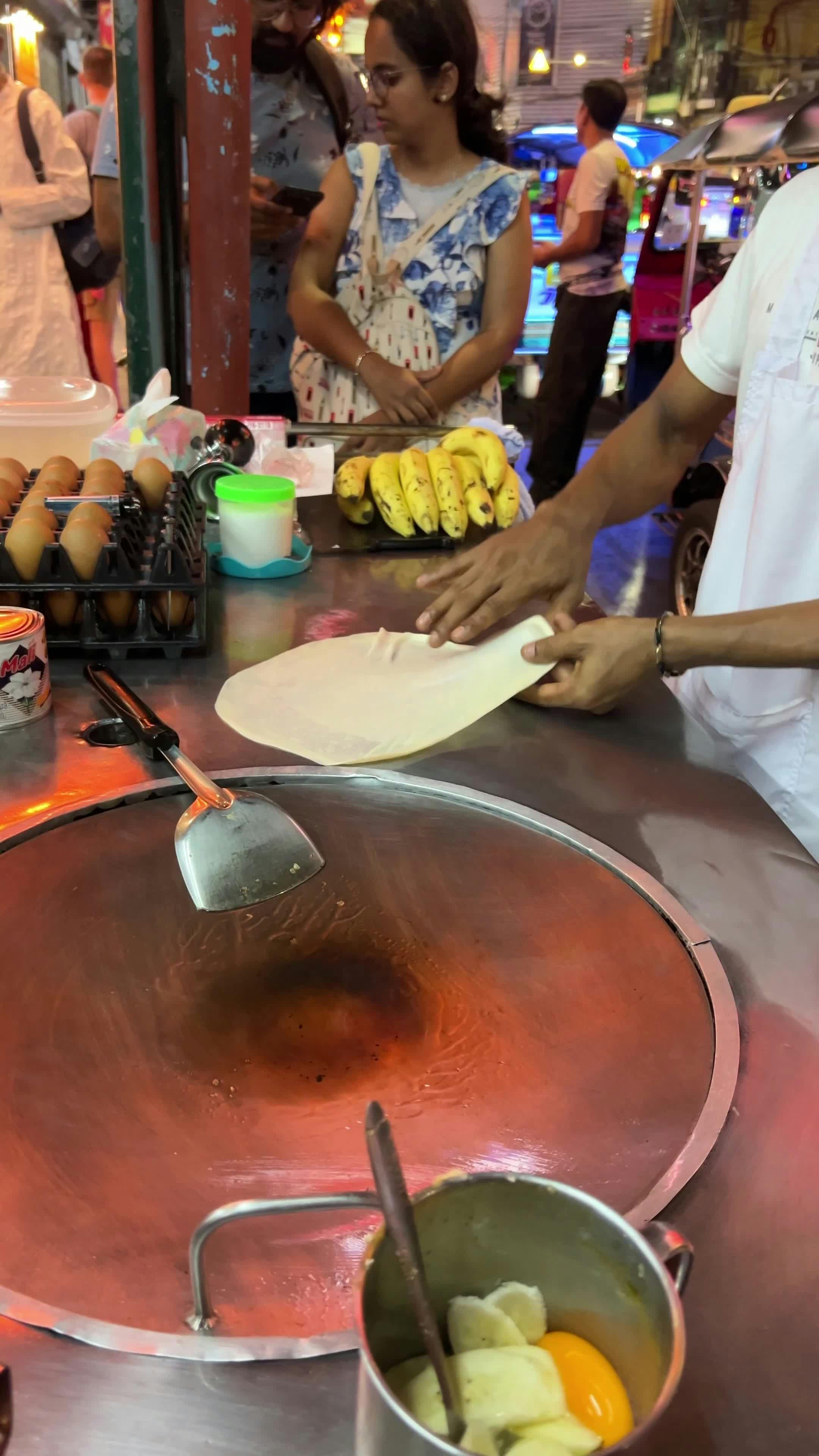 Street Vendor Making Thai Roti with Bananas Free Stock Video Footage ...