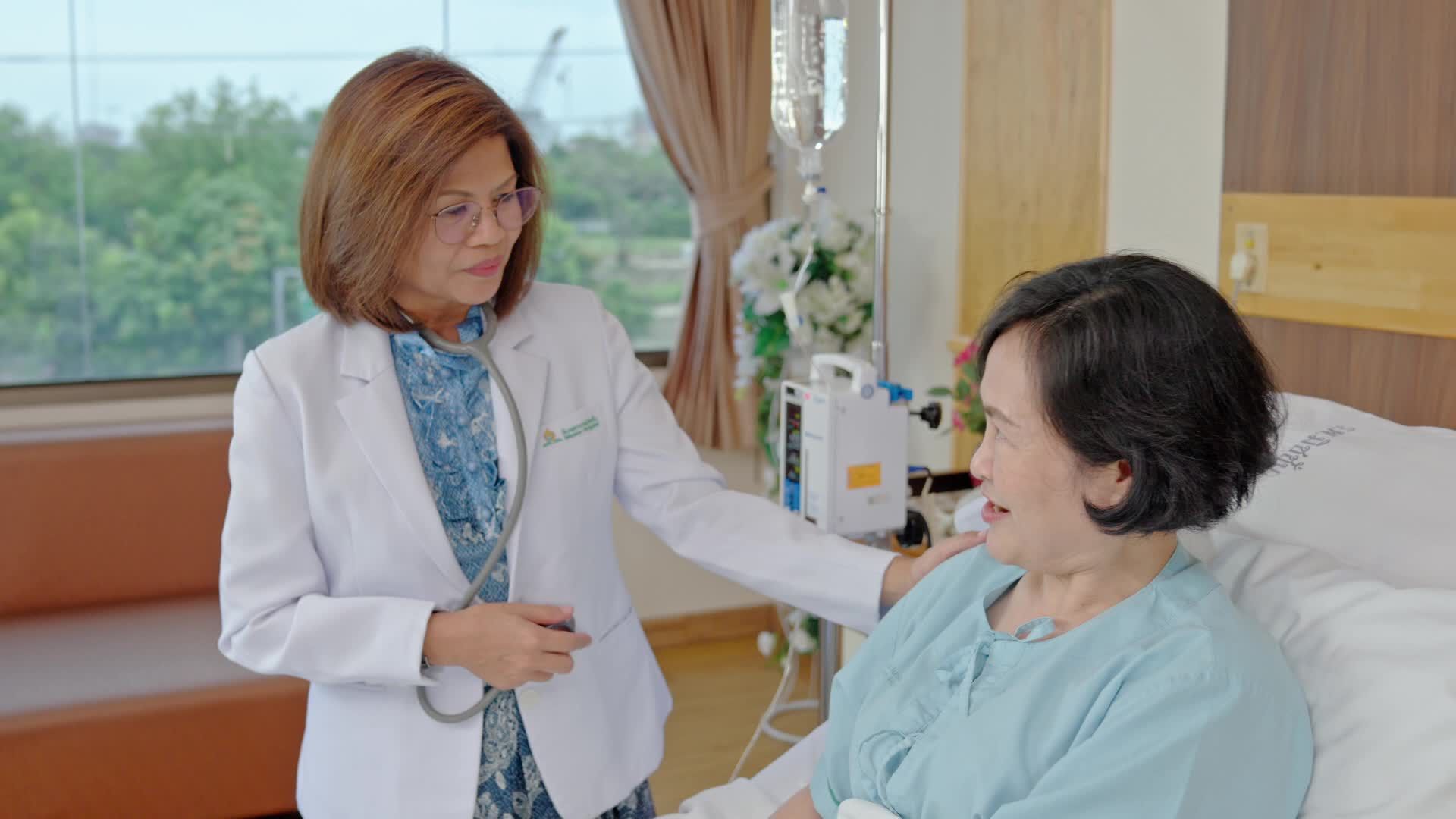 Doctor Interacting with Patient in Hospital Room Free Stock Video ...