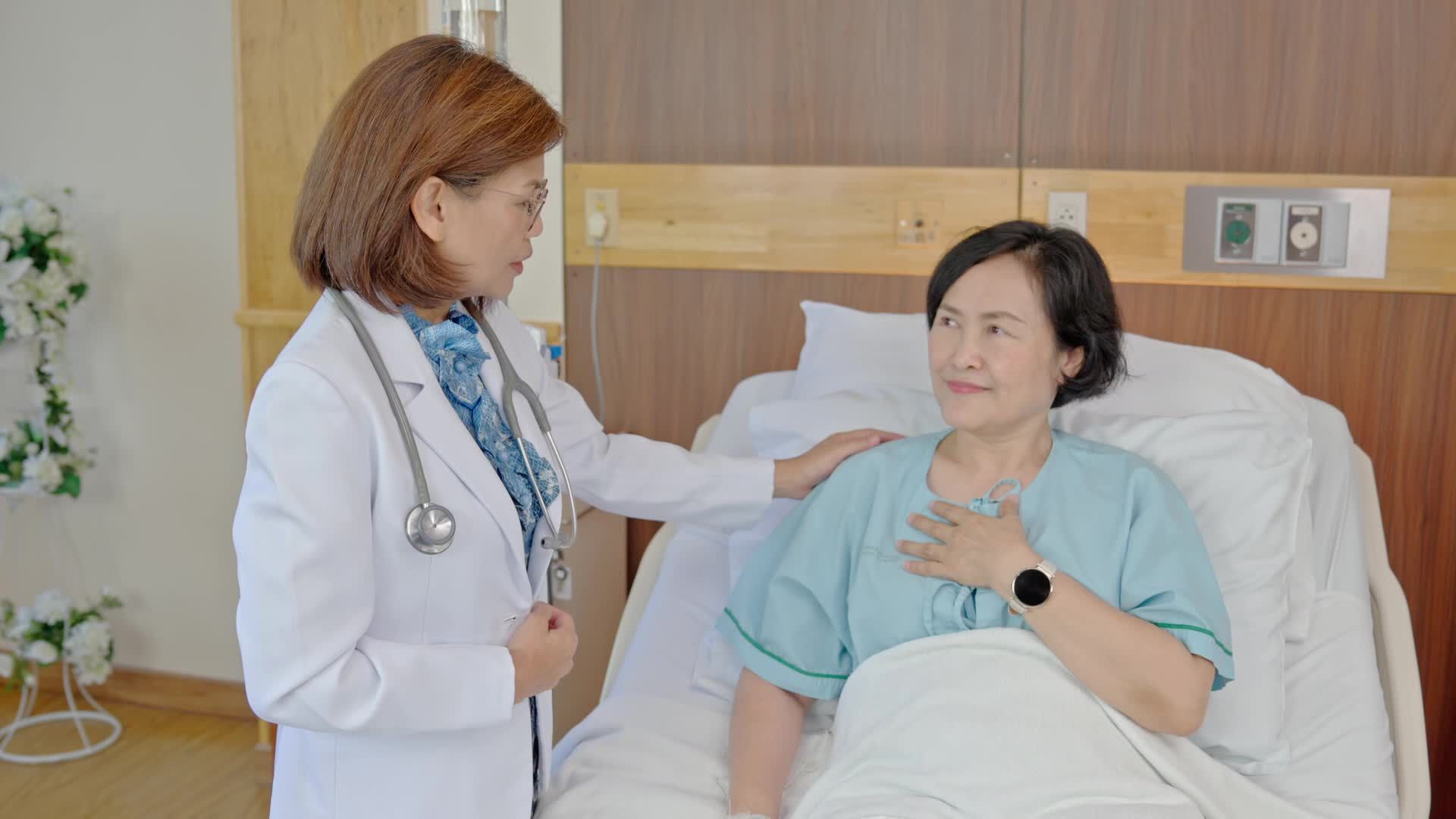 Doctor Providing Care to Hospital Patient Free Stock Video Footage ...