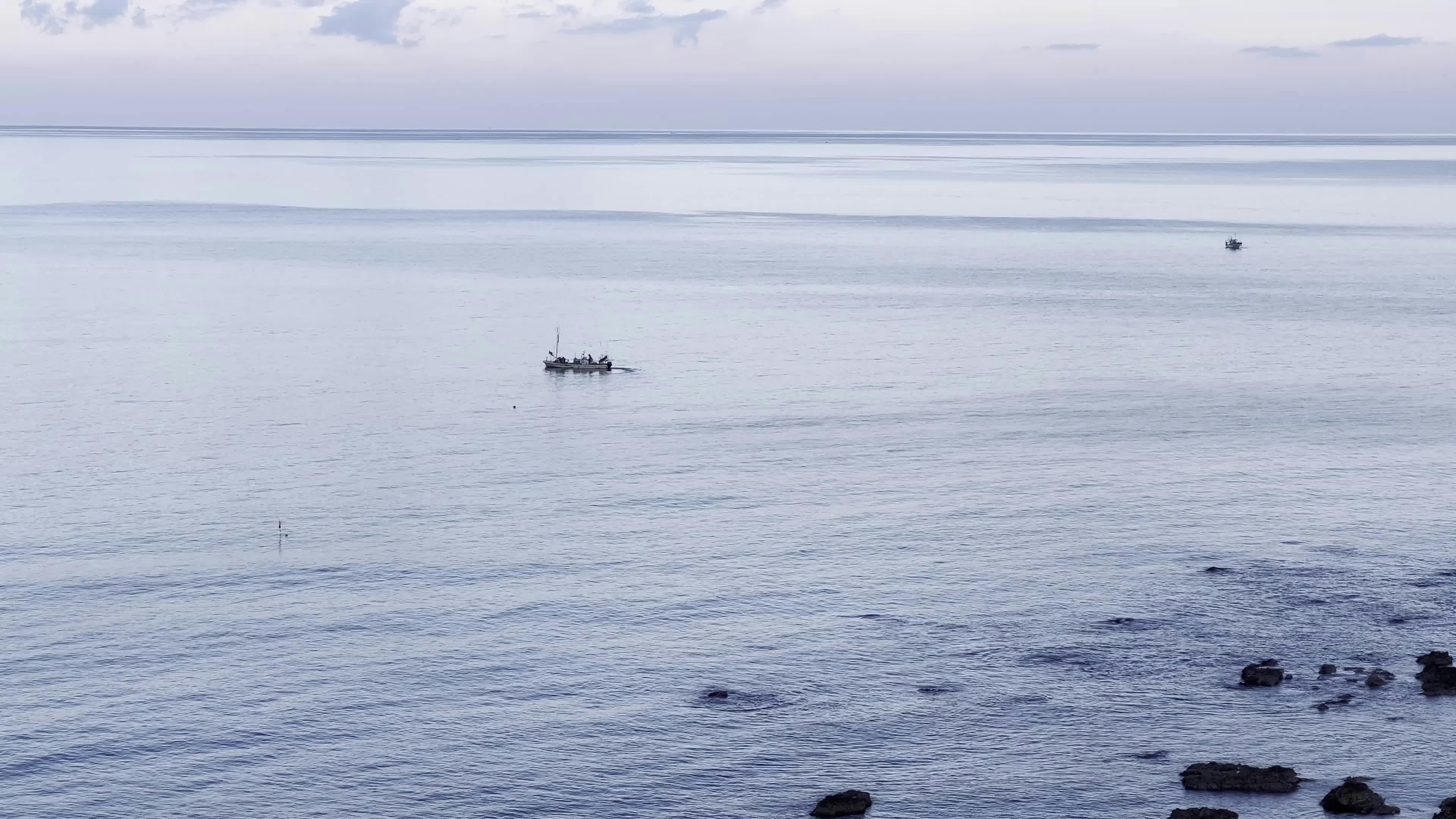 Peaceful Ocean View with Small Fishing Boat Free Stock Video Footage ...