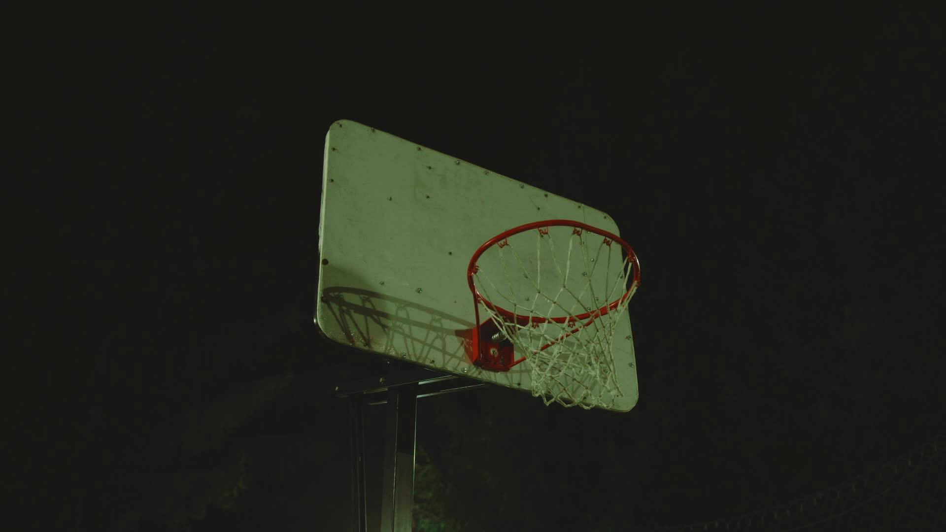 Nighttime Basketball Hoop with Spinning Ball Free Stock Video Footage ...