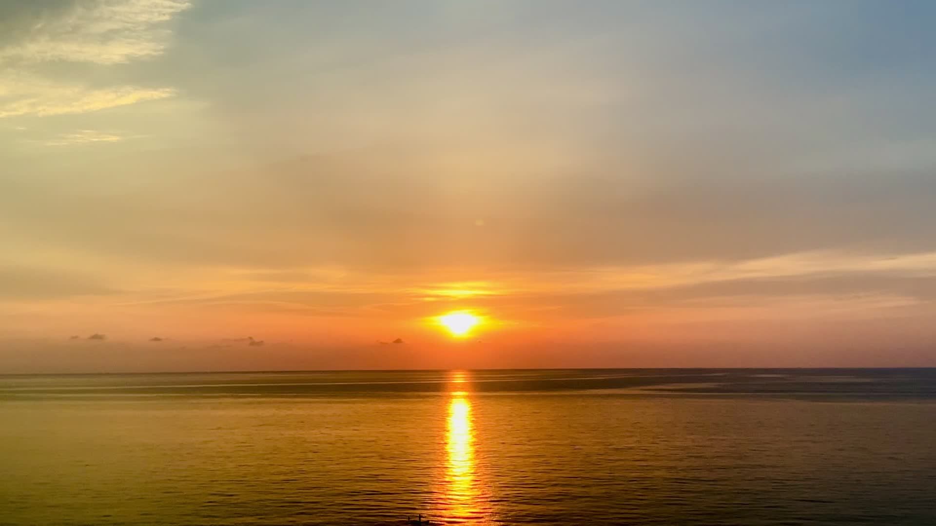 Breathtaking Ocean Sunset with Reflective Waters Free Stock Video ...