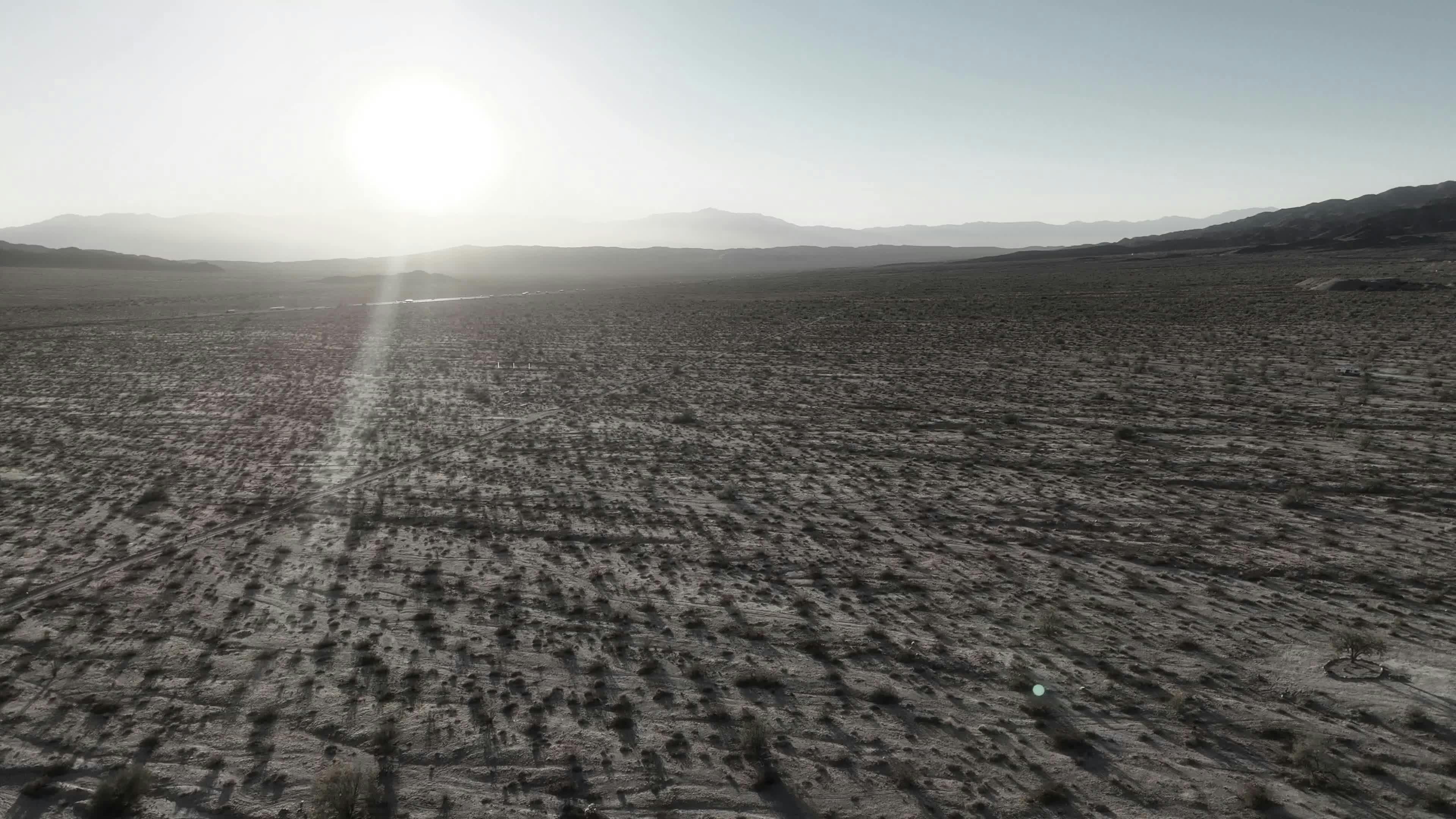 Aerial View of Barren Desert Landscape at Sunrise Free Stock Video ...