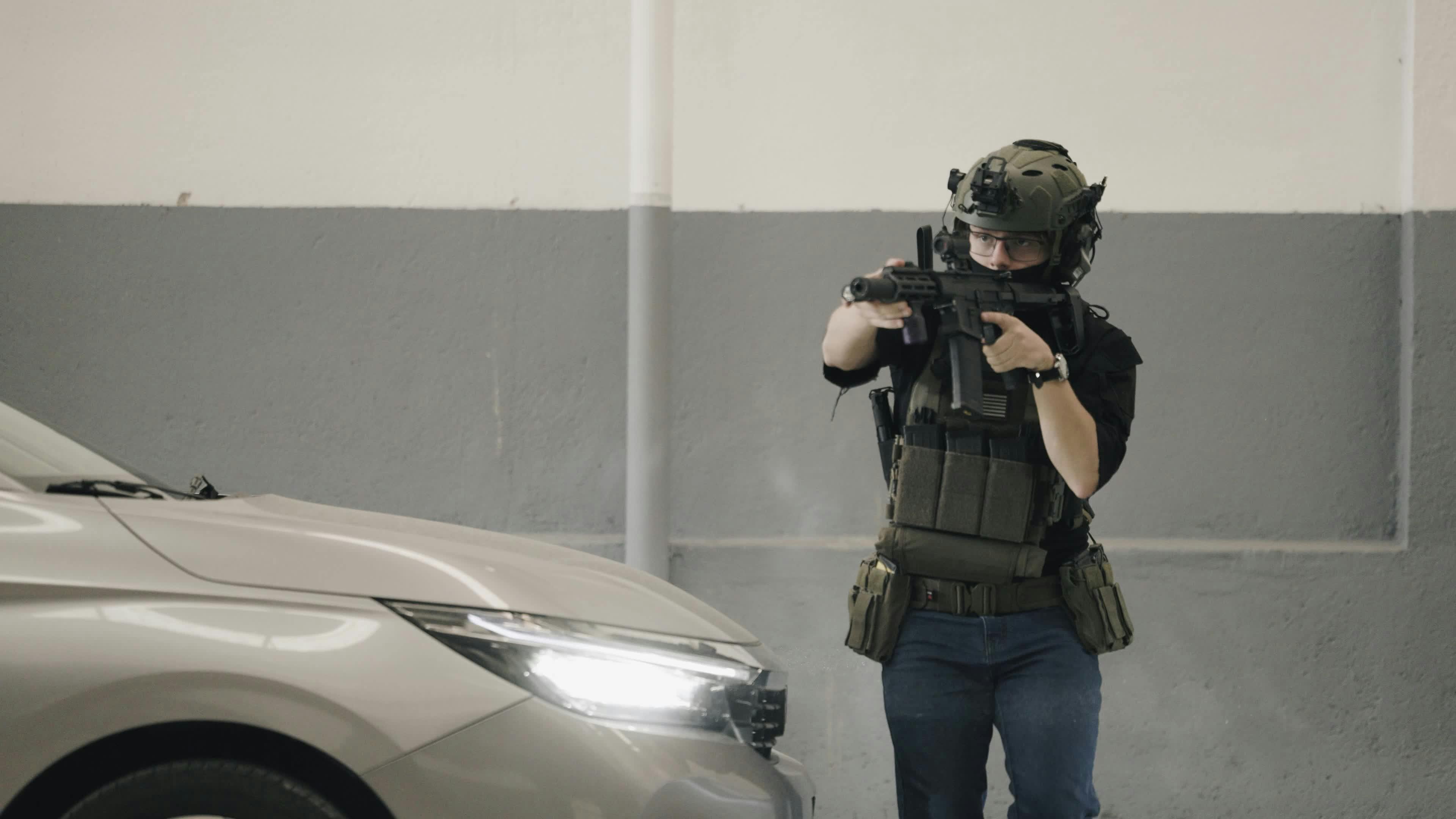 Tactical Operative Engages in Parking Garage Free Stock Video Footage ...