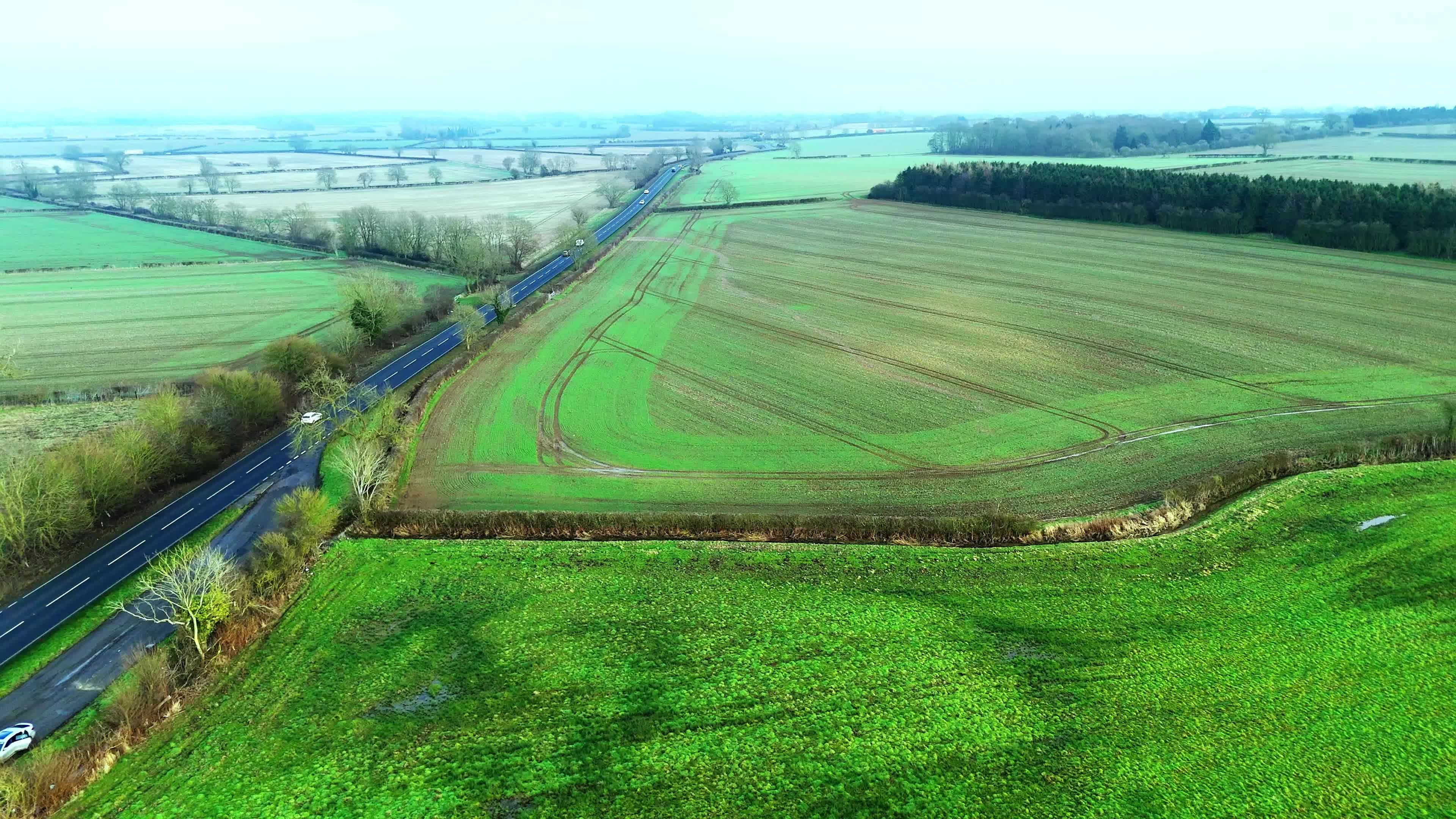 Aerial View of Expansive Farmland and Roadway Free Stock Video Footage ...