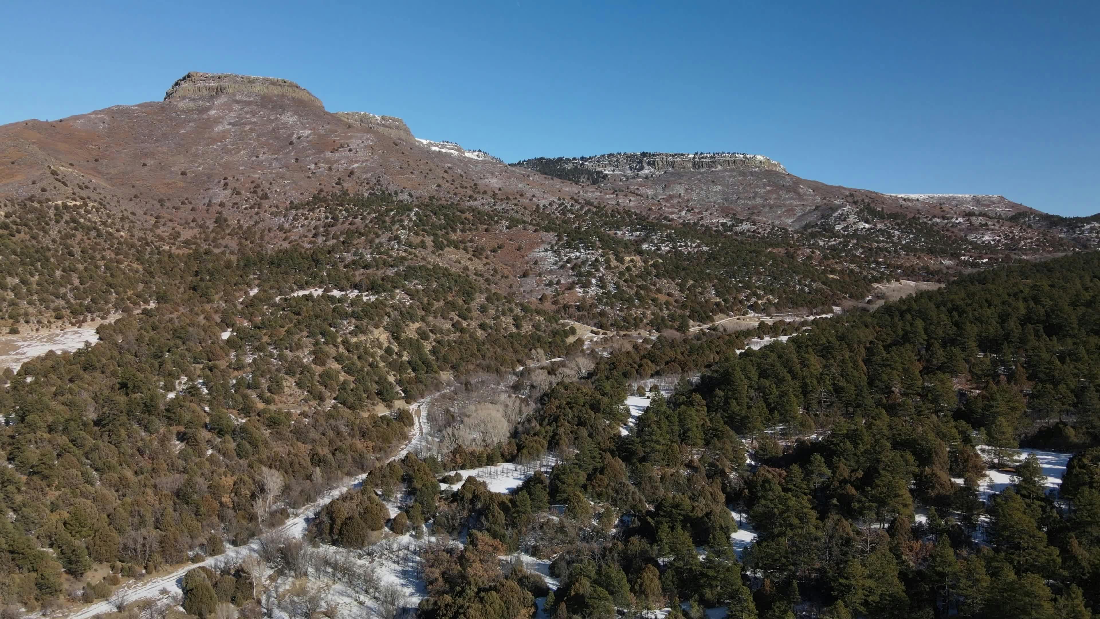 Scenic Aerial View of Snowy Raton Pass Mountains Free Stock Video ...