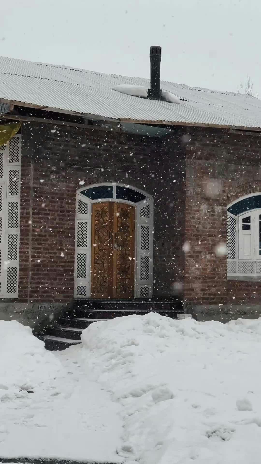 Scenic Snowfall on Rustic Brick House in Kashmir Free Stock Video ...