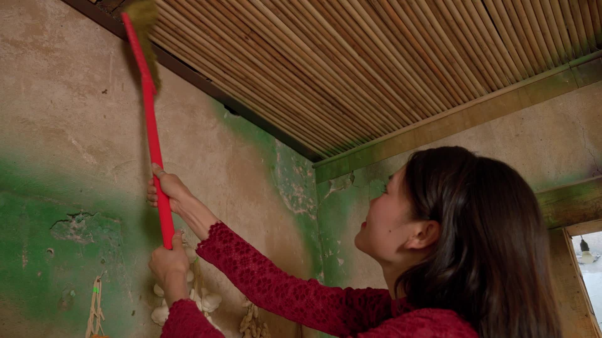 Woman Cleaning Rustic Ceiling with Straw Broom Free Stock Video Footage ...