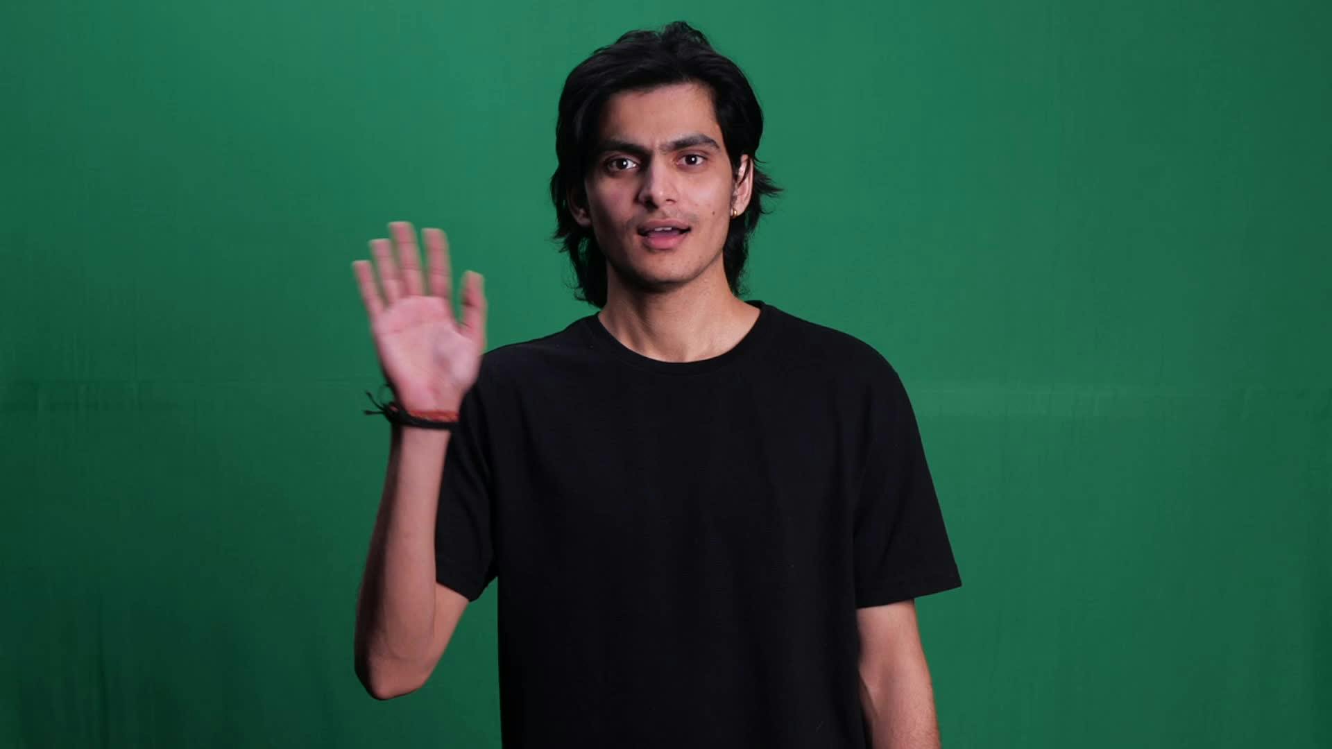 Young Man Expressively Speaking on Green Screen Free Stock Video ...
