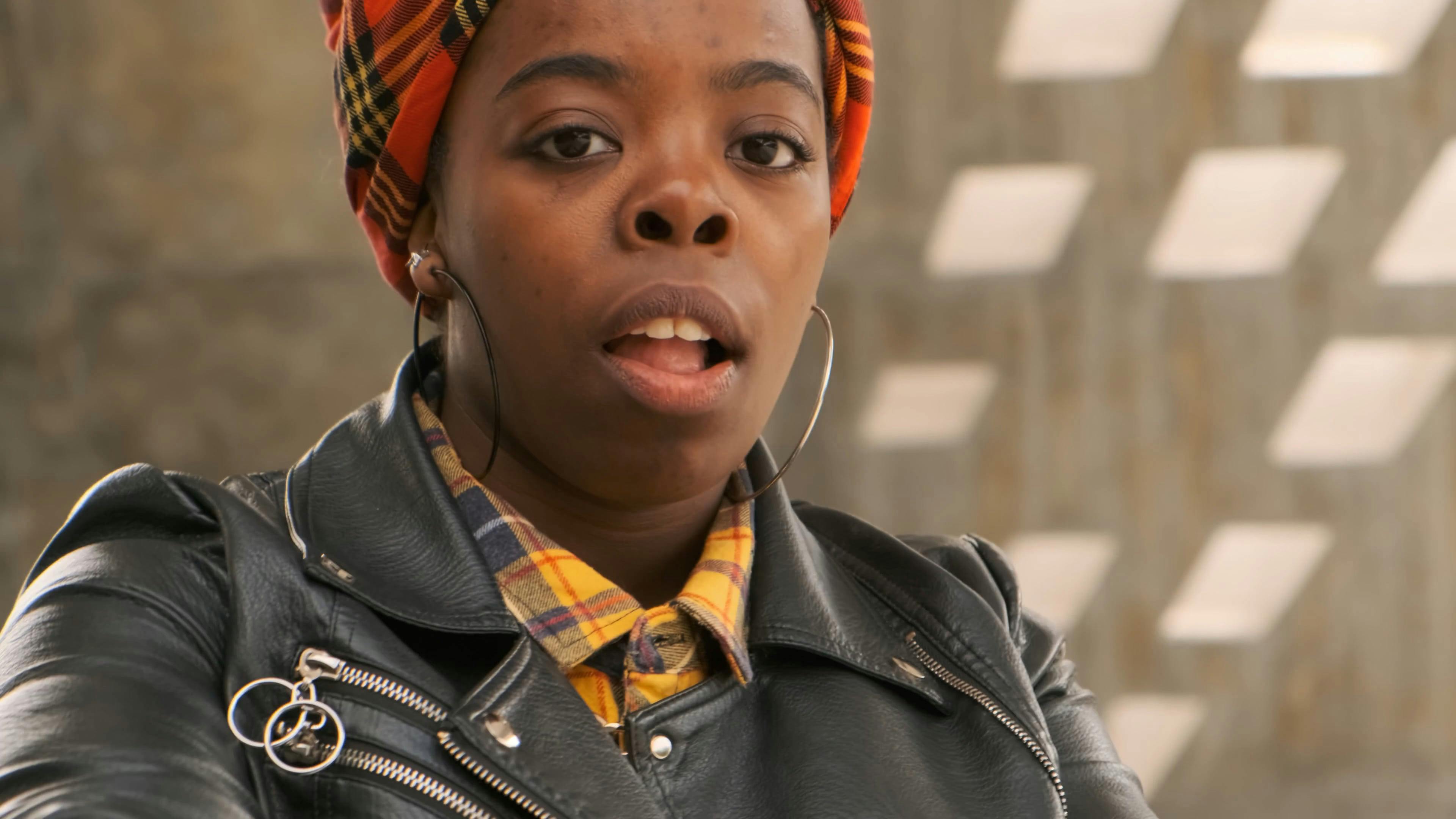 A Woman Dancing Freely Outdoors On A Concrete Pavement Free Stock Video ...